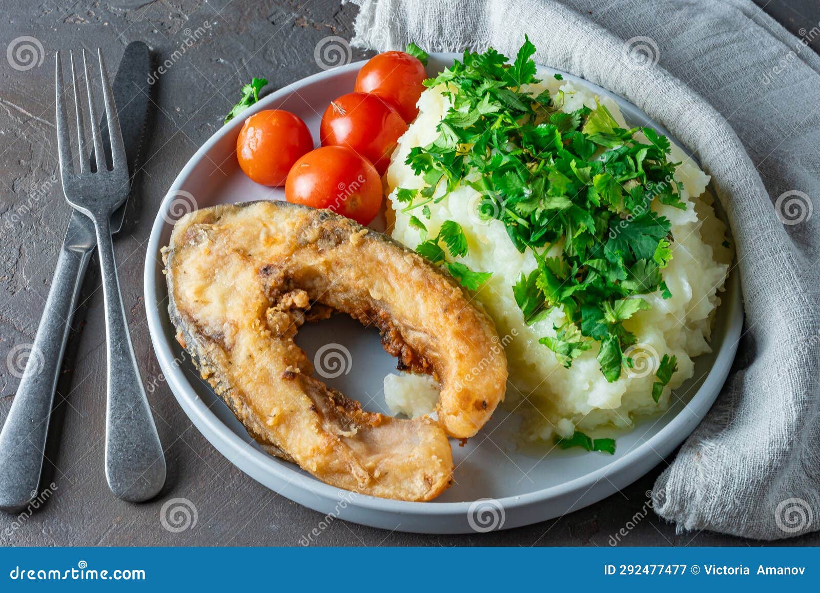 Fish with Mashed Potatoes, Cherry Tomatoes and Parsley. Stock Image ...