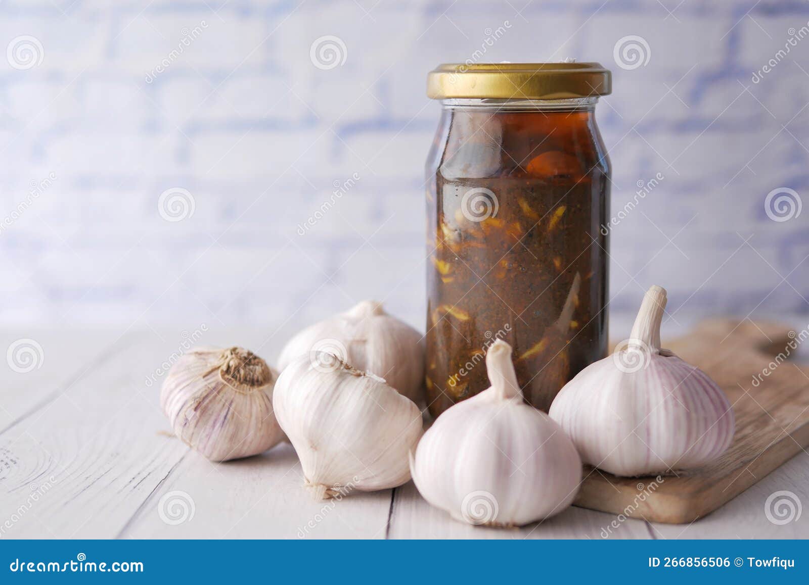 Homemade Garlic Pickle in a Glass Jar on Table , Stock Photo - Image of ...