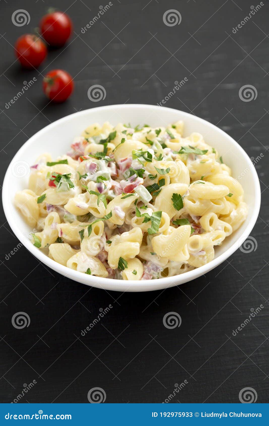 Homemade Macaroni Salad in a White Bowl on a Black Surface, Side View ...