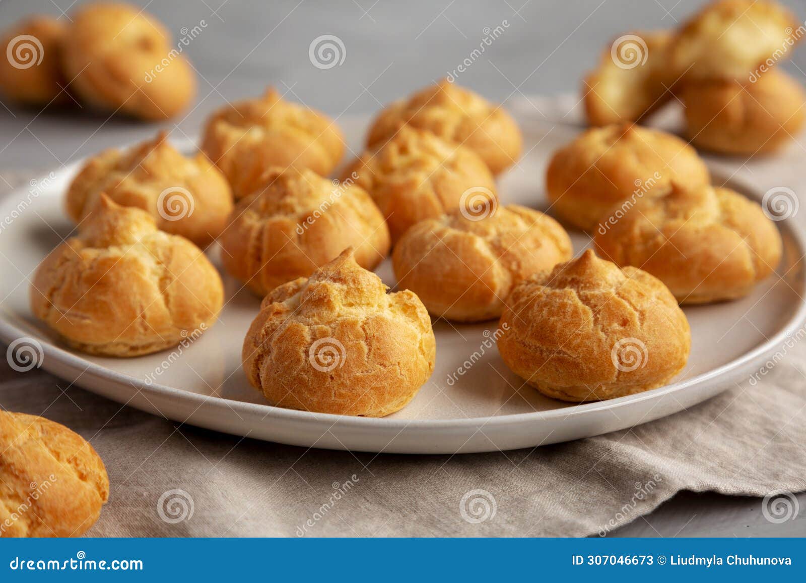 Homemade Mini Cream Puffs on a Plate, Low Angle View Stock Image ...