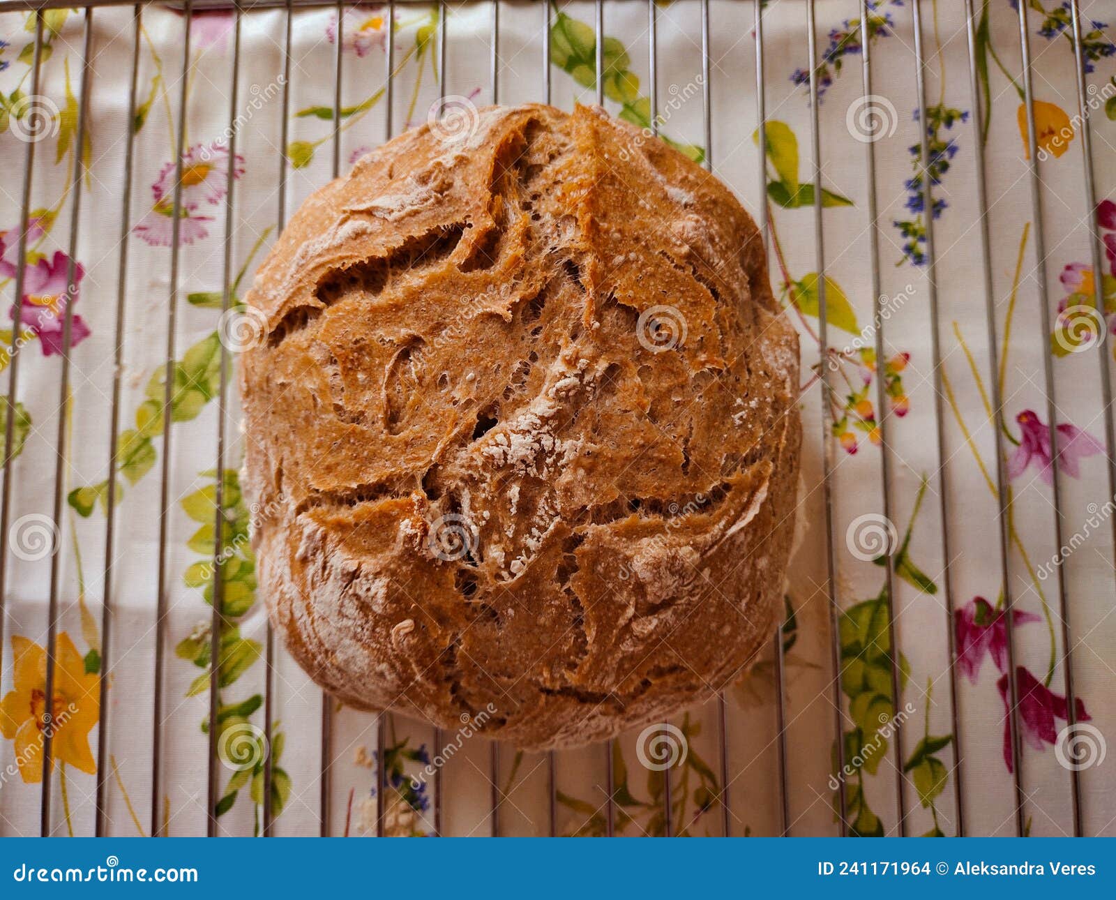 Homemade Multi Grain Sourdough Bread on the Cooling Rack on the Table ...