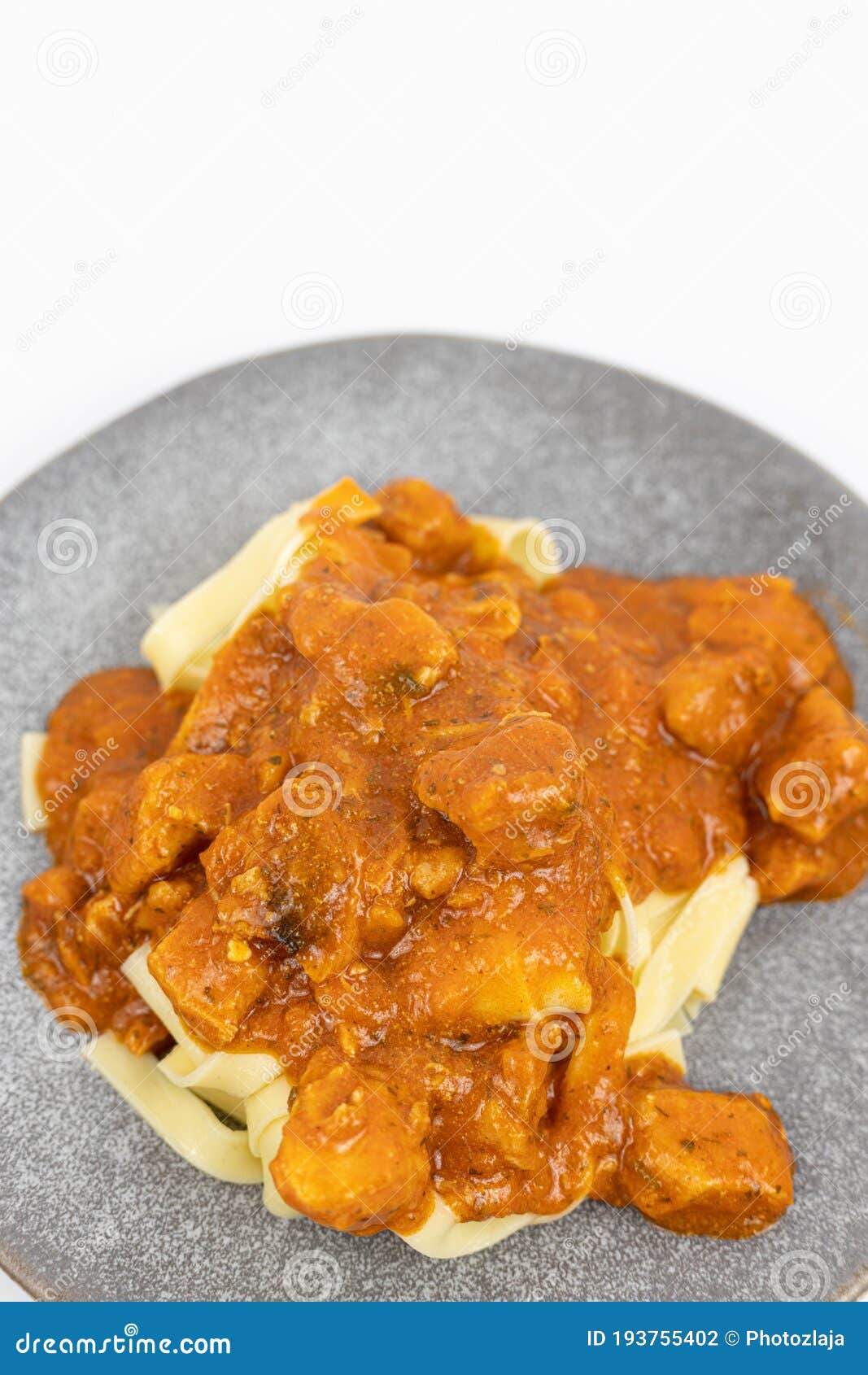 Homemade Pasta Served with Chicken Stew on the Plate Stock Photo ...