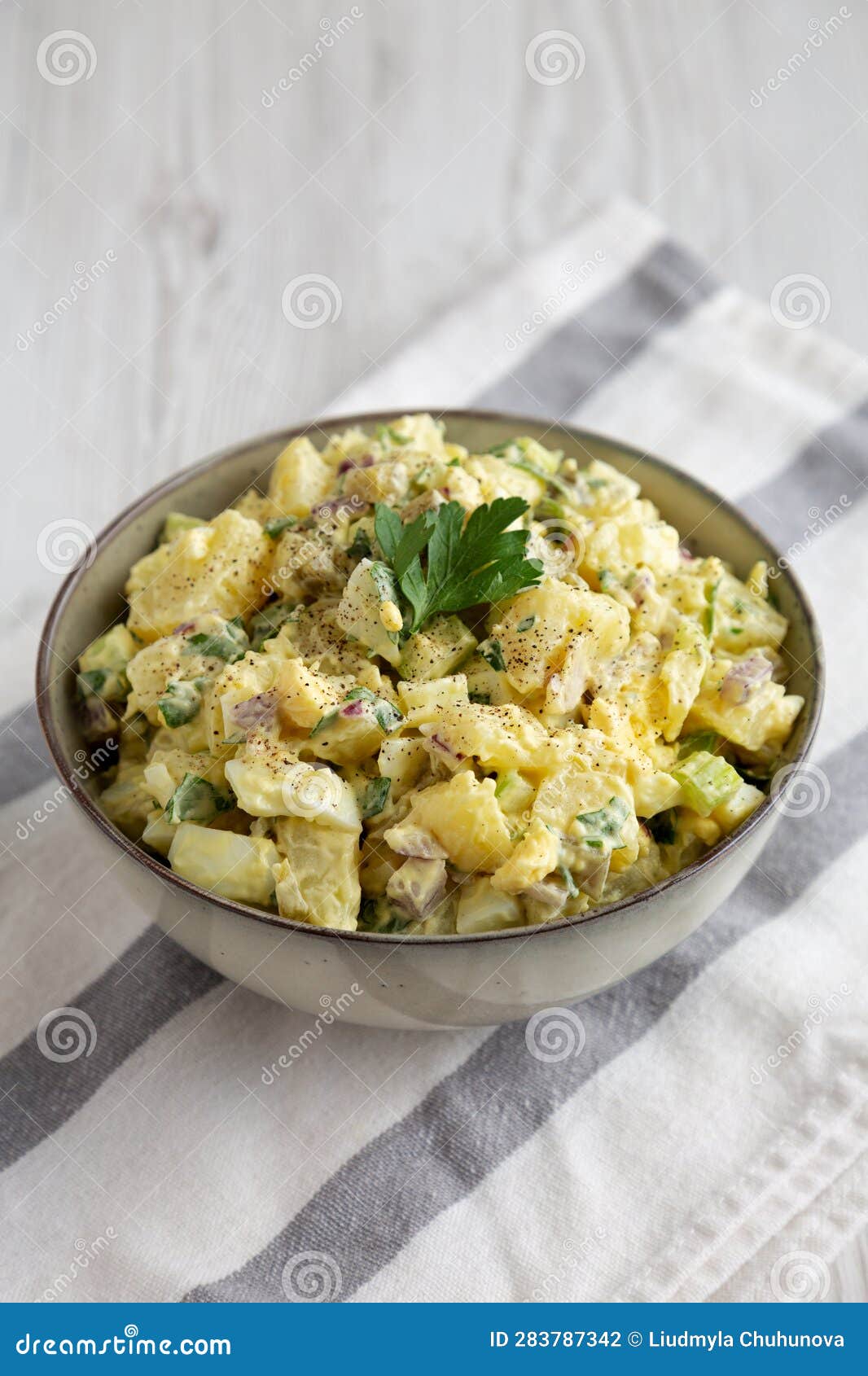 Homemade Potato Egg Salad with Pickles in a Bowl, Side View Stock Photo ...