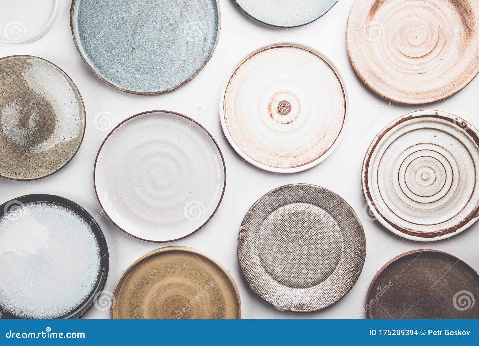 Homemade pottery plates stock photo. Image of empty - 175209394