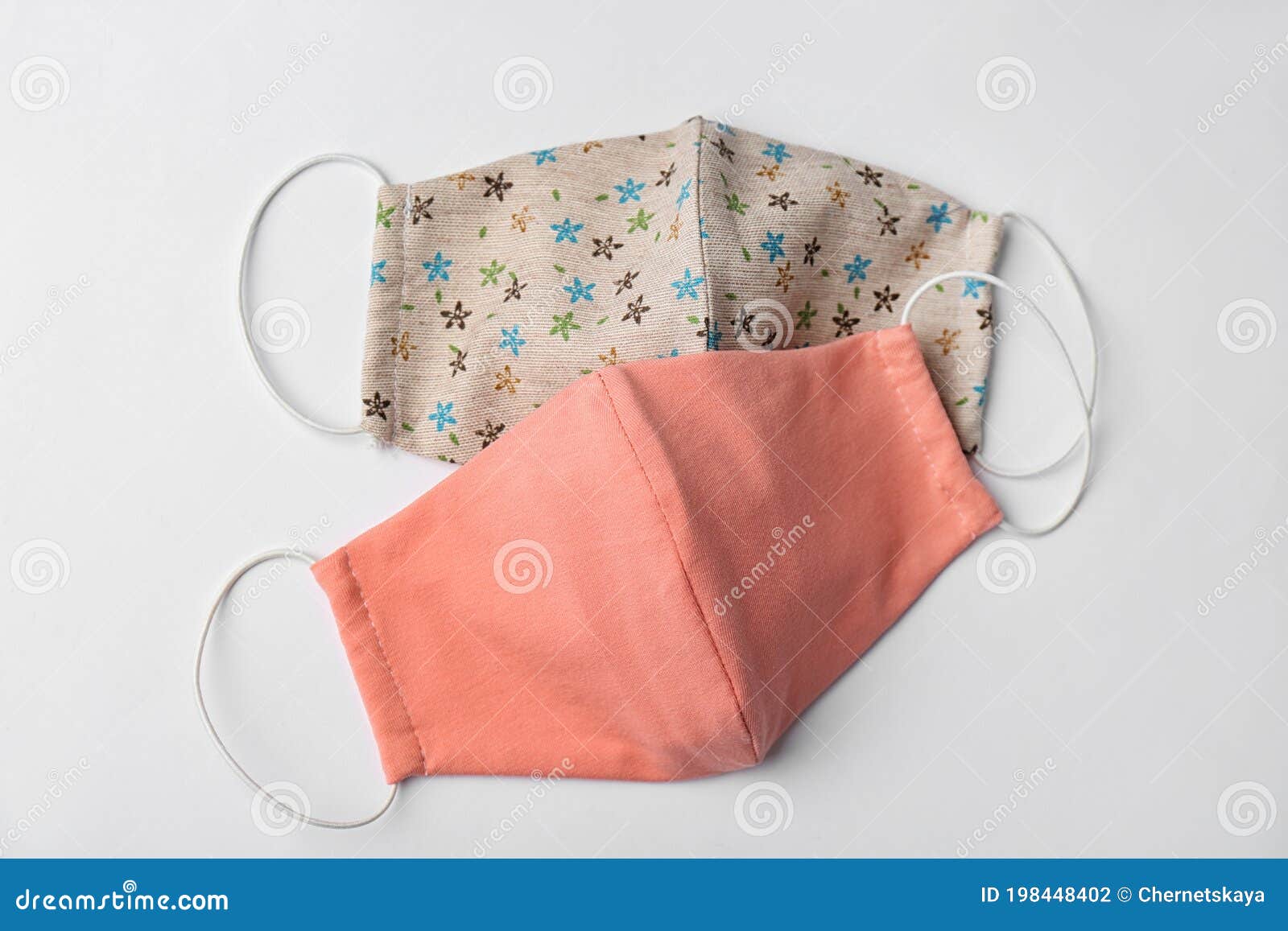 Homemade Protective Face Masks Isolated on White, Top View Stock Photo ...