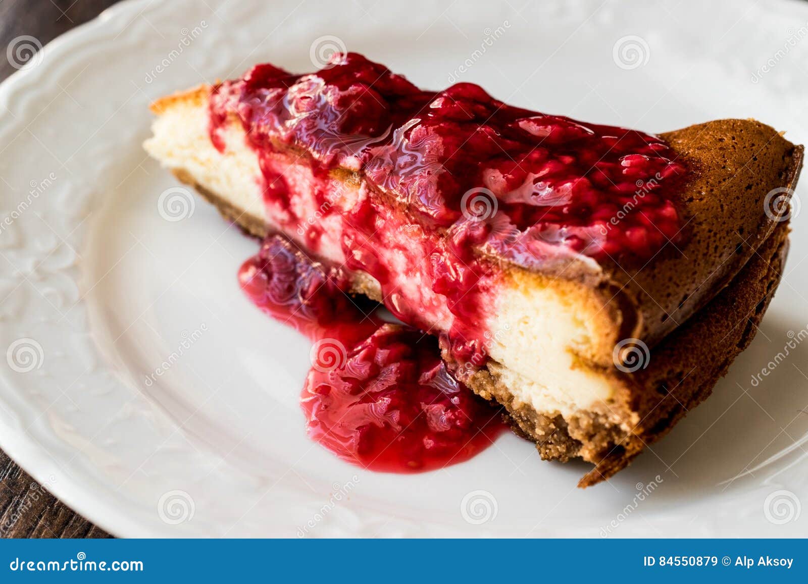 Homemade Raspberry Cheesecake in White Plate Stock Image - Image of ...