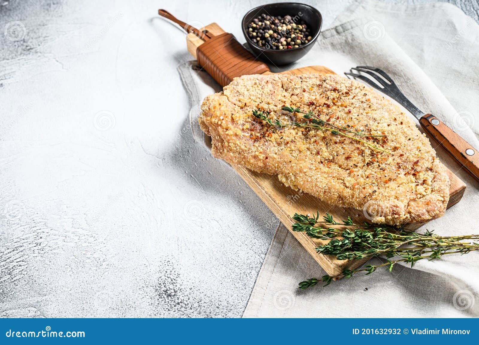 Homemade Raw Breaded German Weiner Schnitzel. Gray Background. Top View ...