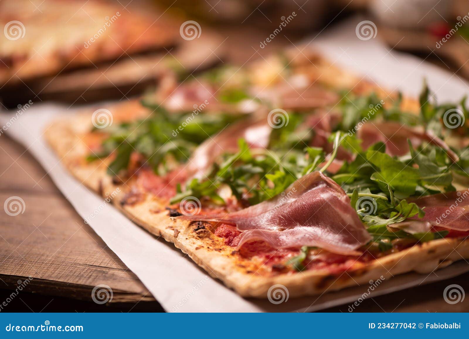 Homemade Rectangular Pizza on a Rustic Table Stock Photo - Image of ...