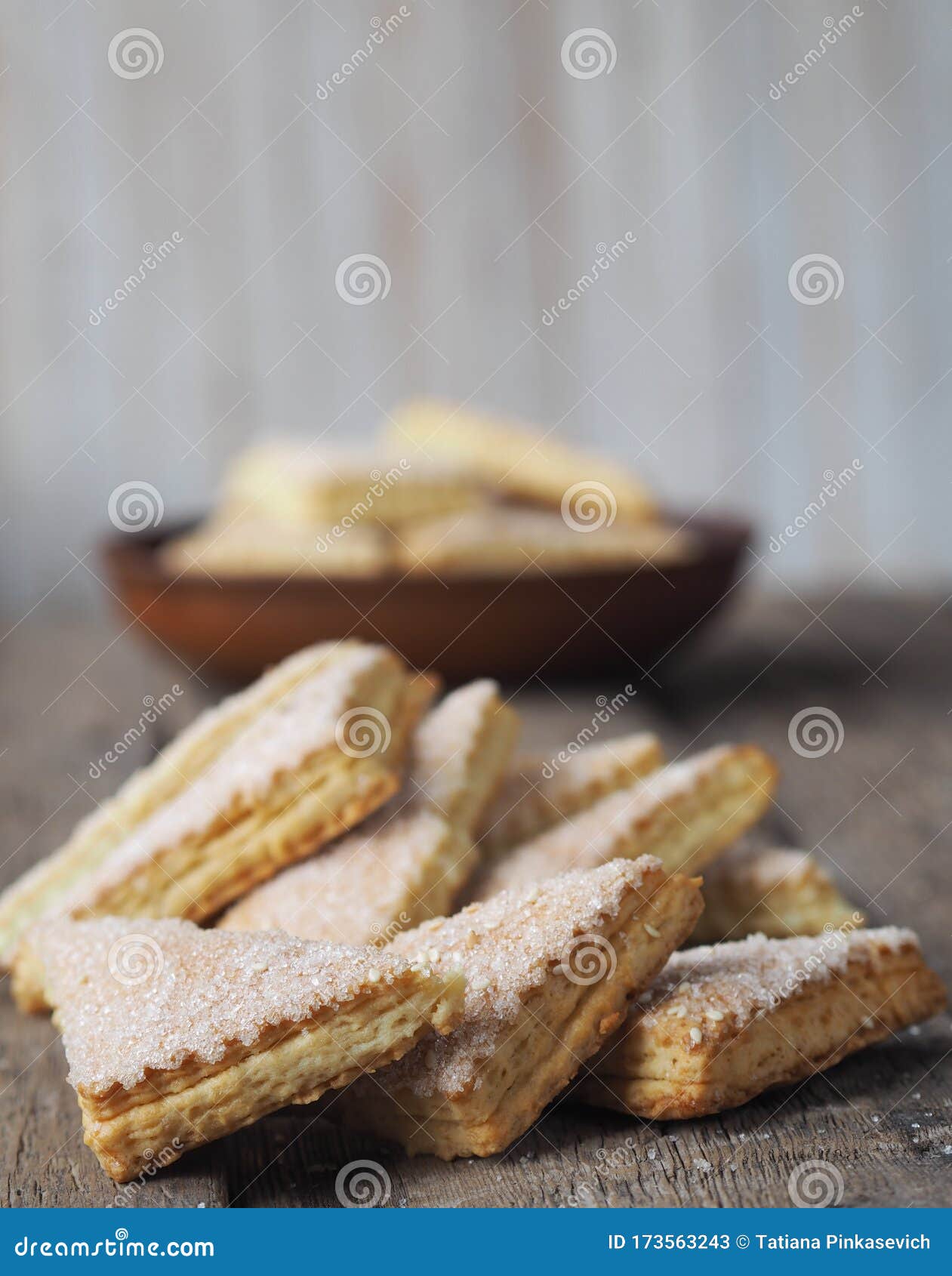 Homemade Shortbread Puff Pastry Triangle in a Brown Plate on a Wooden ...