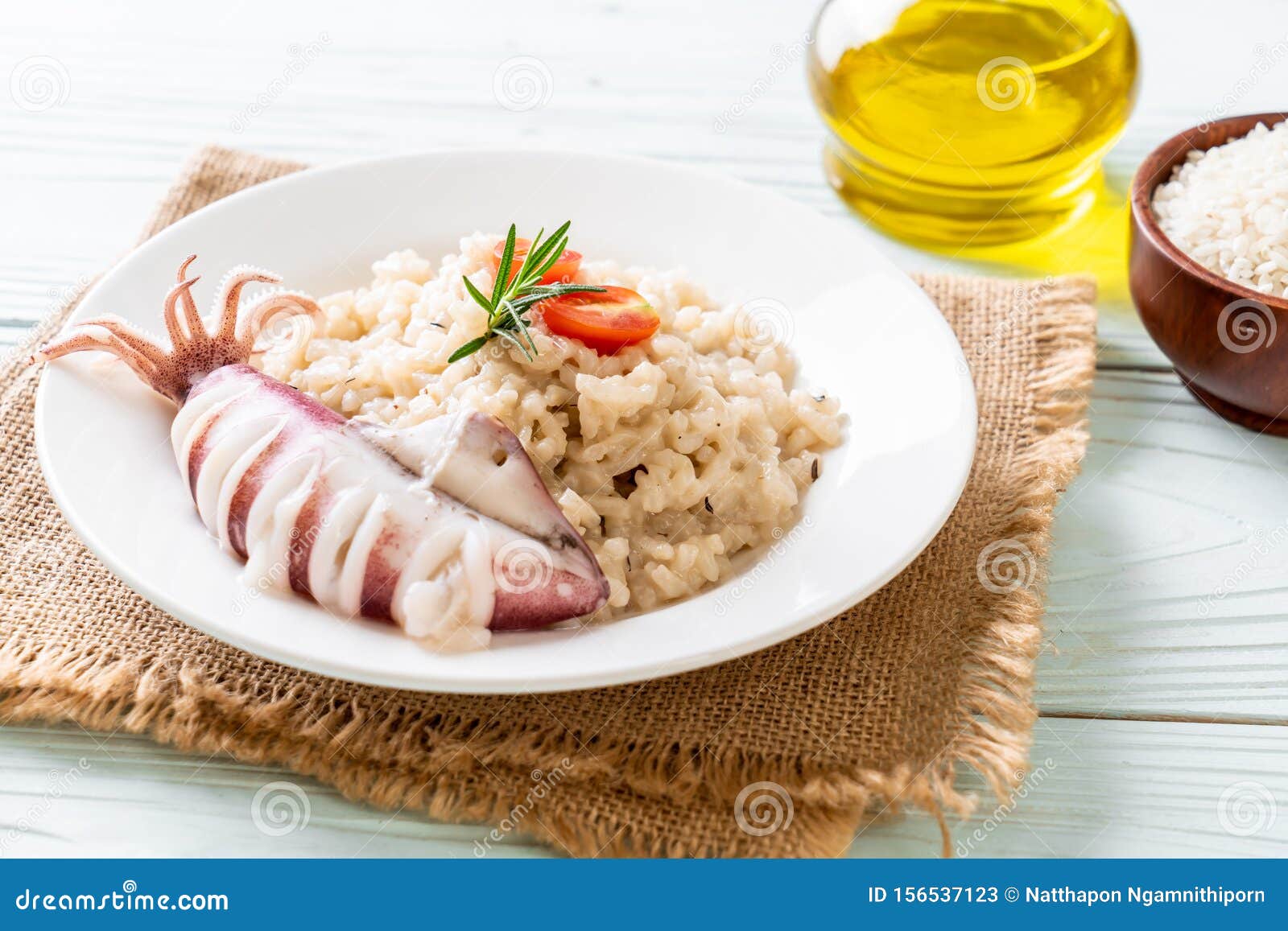 Squids or octopus risotto stock image. Image of food - 156537123