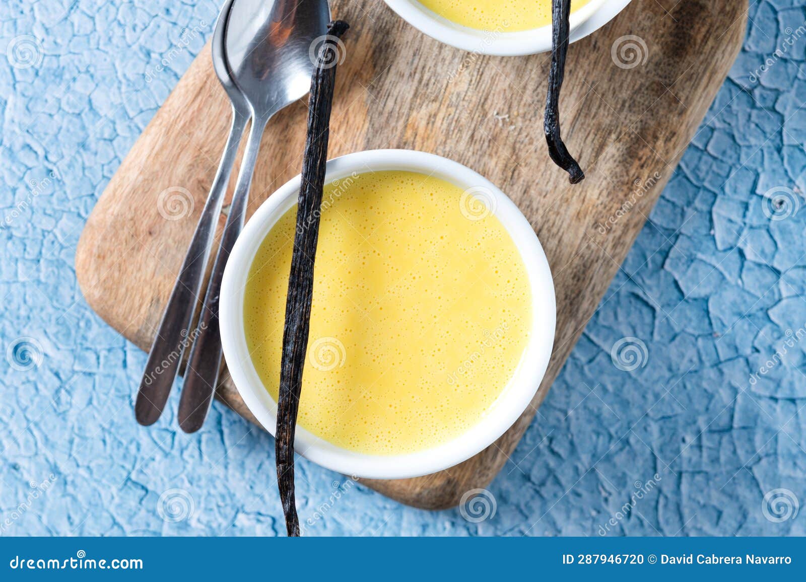Homemade Vanilla Custard on Blue Background Stock Photo - Image of ...