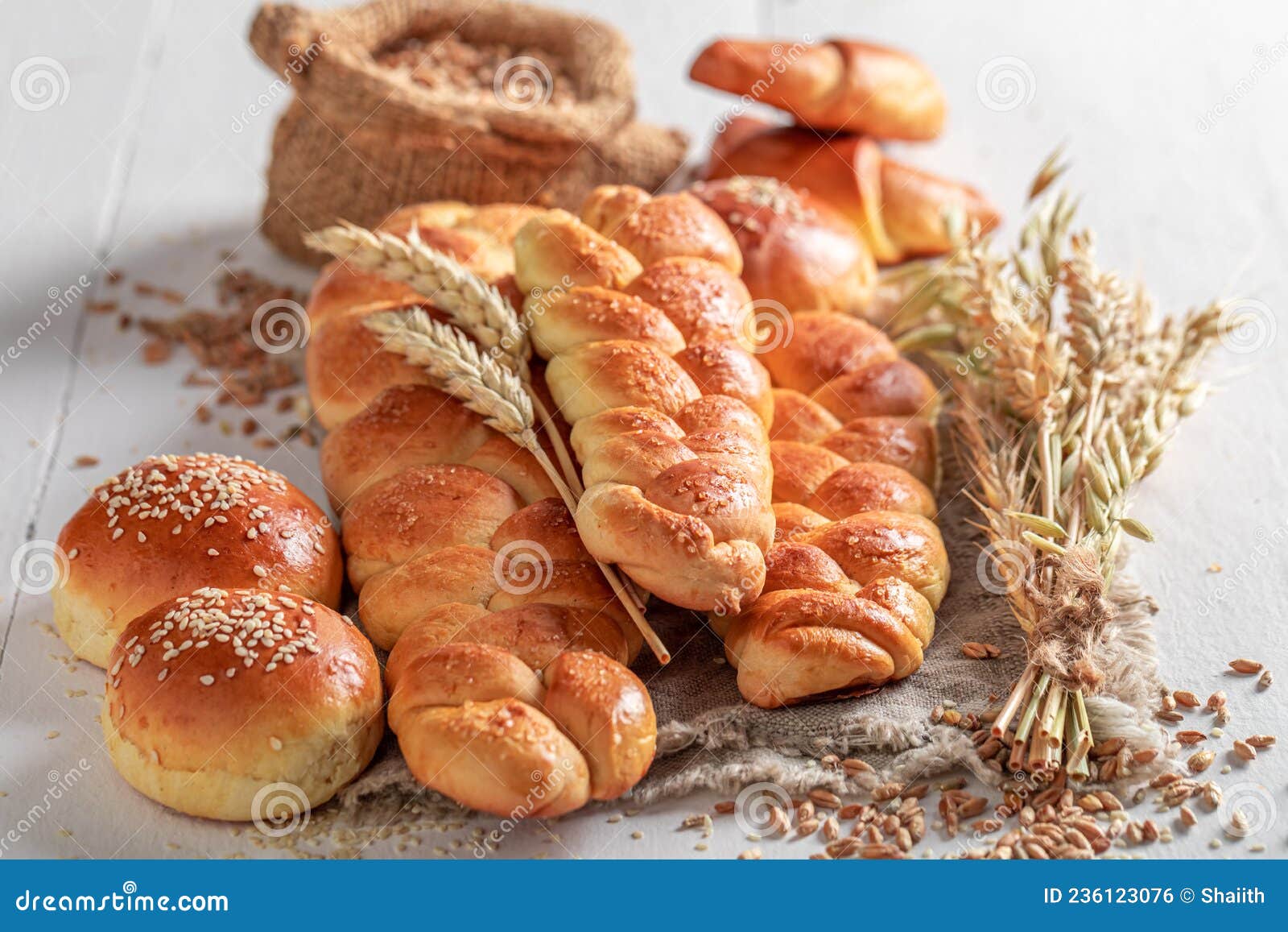Homemade Variety of Breads on Table in Rustic Kitchen Stock Photo ...