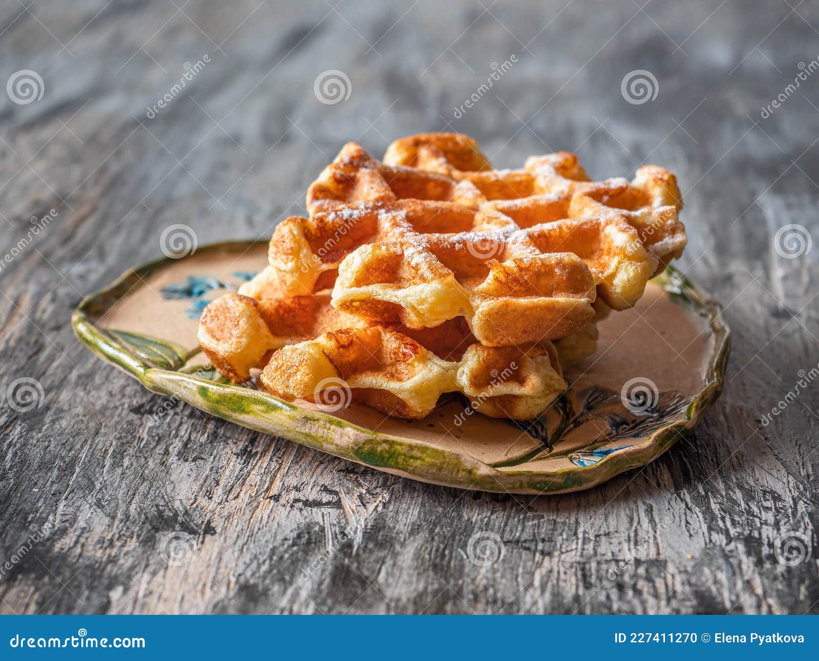 Homemade Waffles Laid Out in a Stack on a Decorative Clay Plate Stock ...