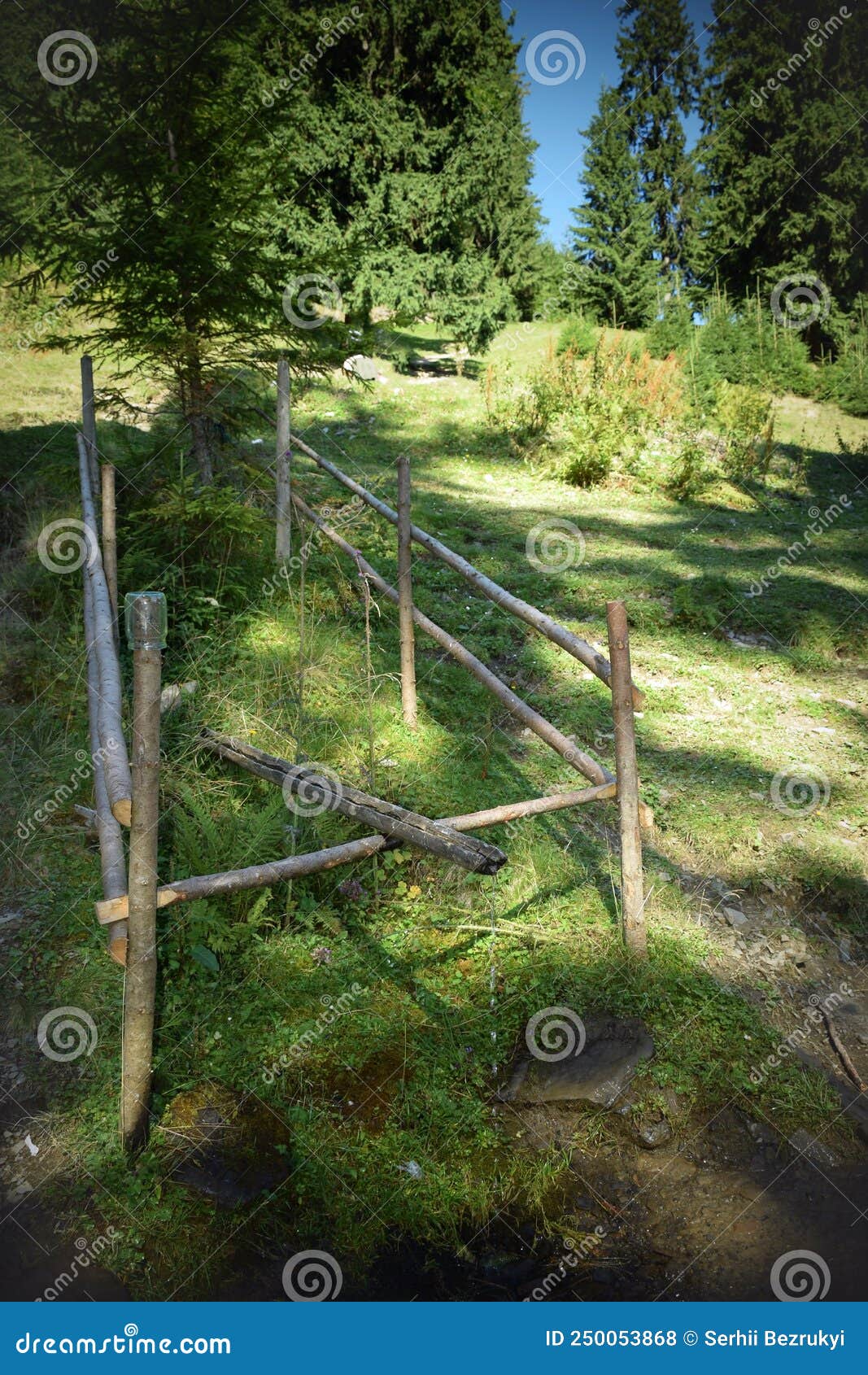 Homemade Water Source in the Mountains from a Wooden Structure Under ...