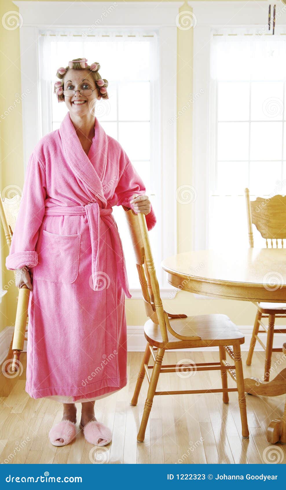 Homemaker stock image. Image of robe, woman, pink, laugh - 1222323
