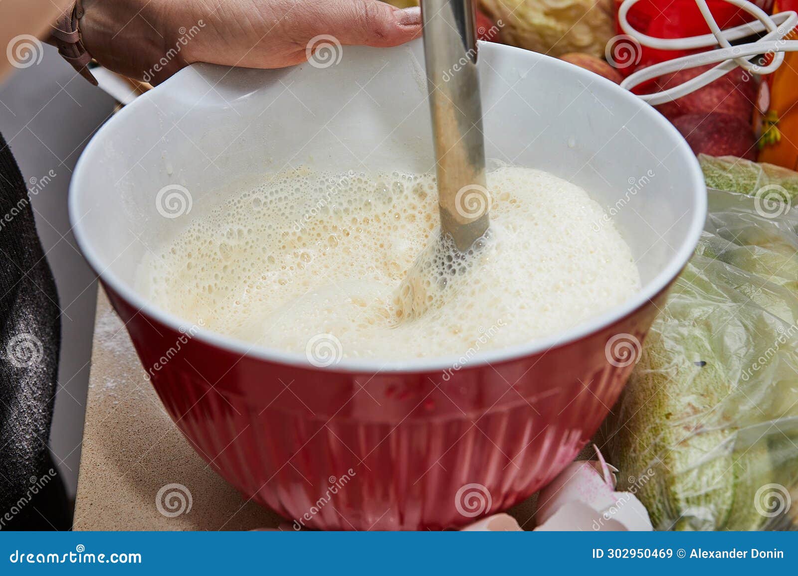 Homemaker Whisking Pancake Batter in Kitchen with Blender and Bowl ...