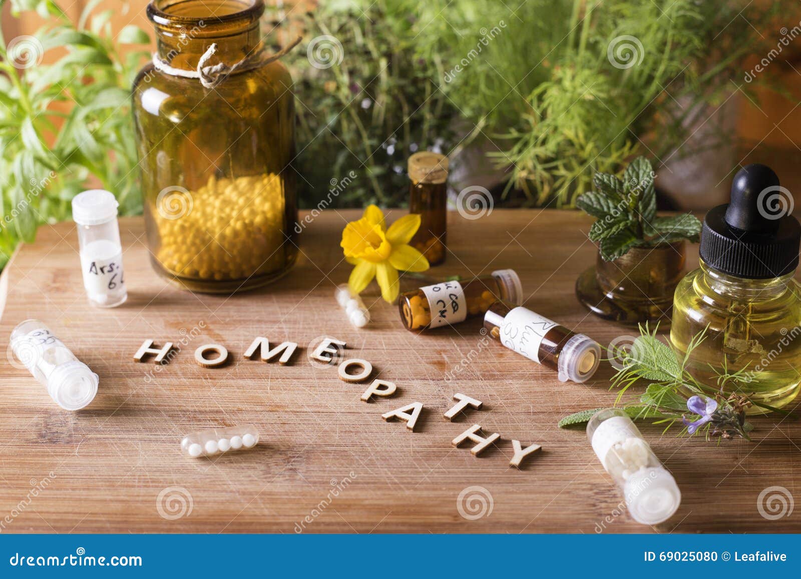 Homeopathy Globules and Bottles Stock Photo - Image of remedy, clear ...