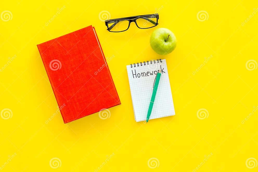 Homework Concept. Word Homework Written in Notebook on Yellow Desk with ...