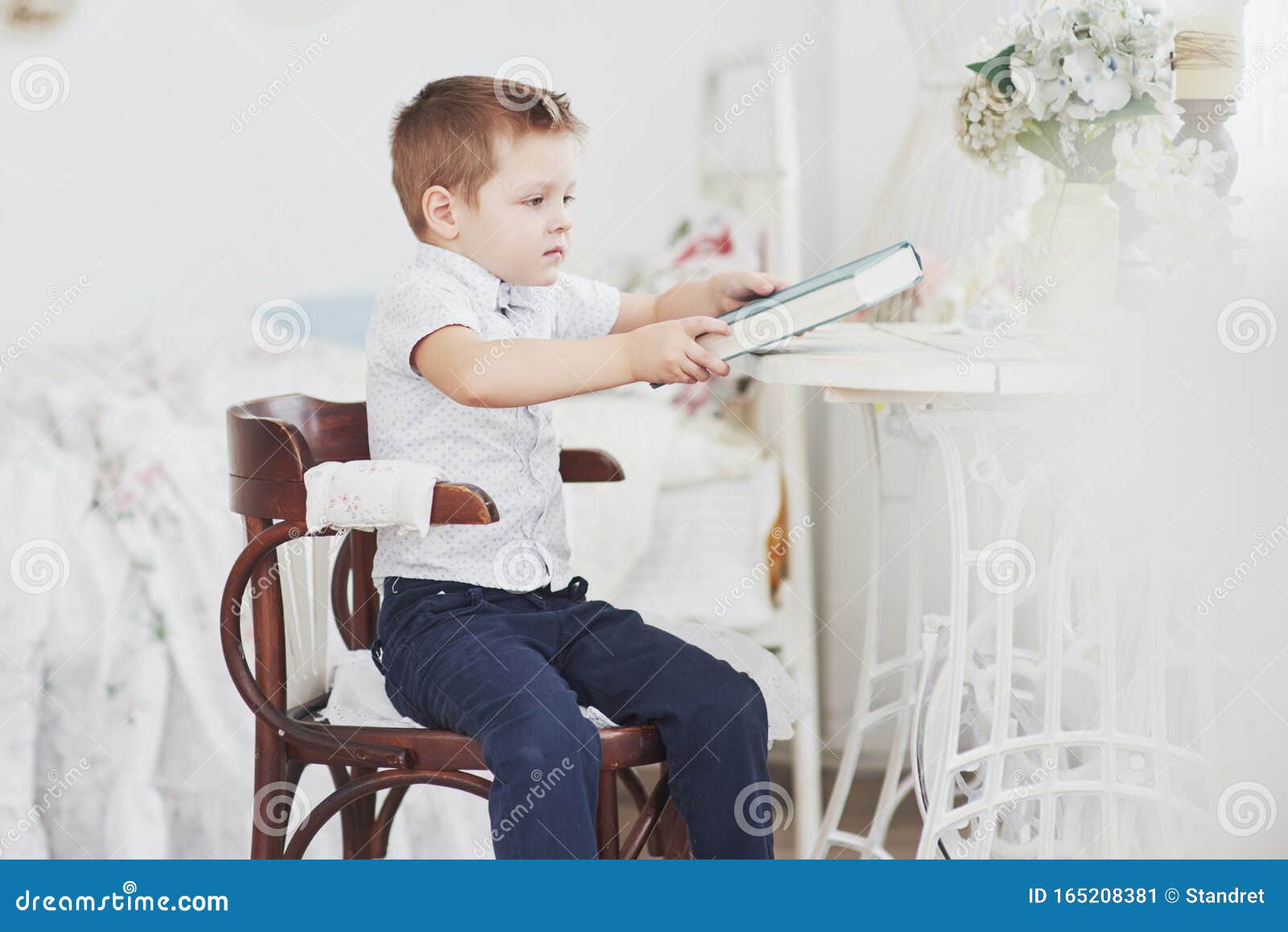 Homework and School Concept - Bored Student Boy Reading Book or ...