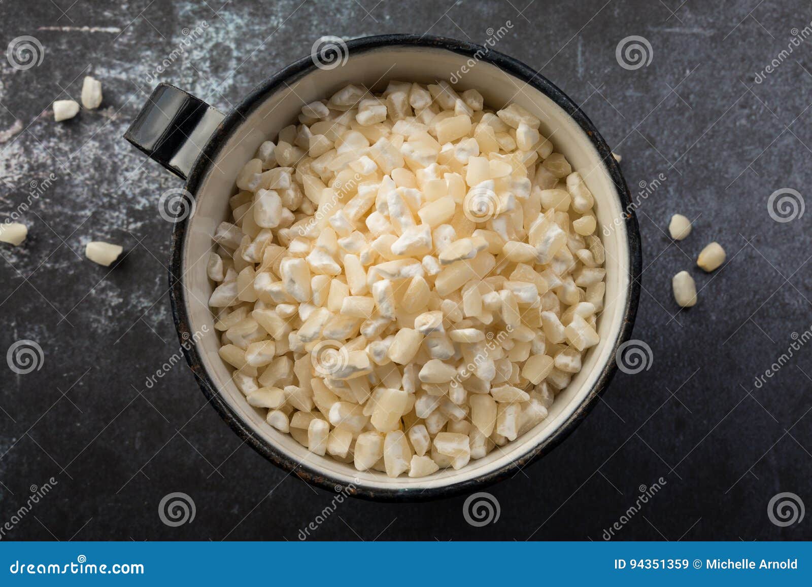 Dry Hominy in a Metal Cup stock image. Image of maize - 94351359