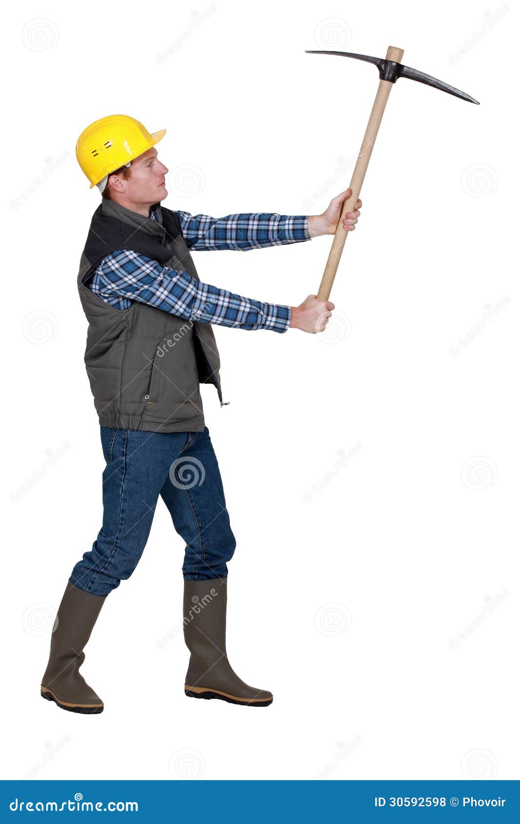 Homme utilisant la pioche photo stock. Image du densité - 30592598