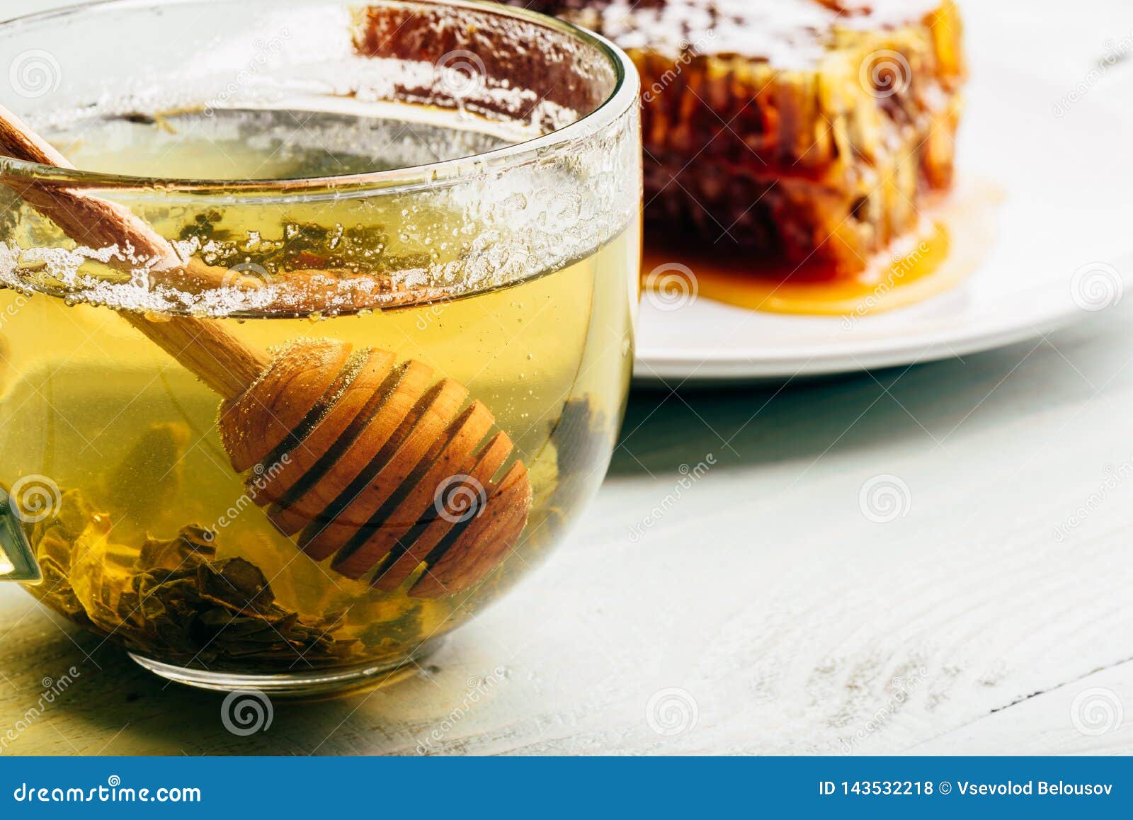 Honey Dipper in Cup of Green Tea Stock Photo - Image of spoon, sweet ...