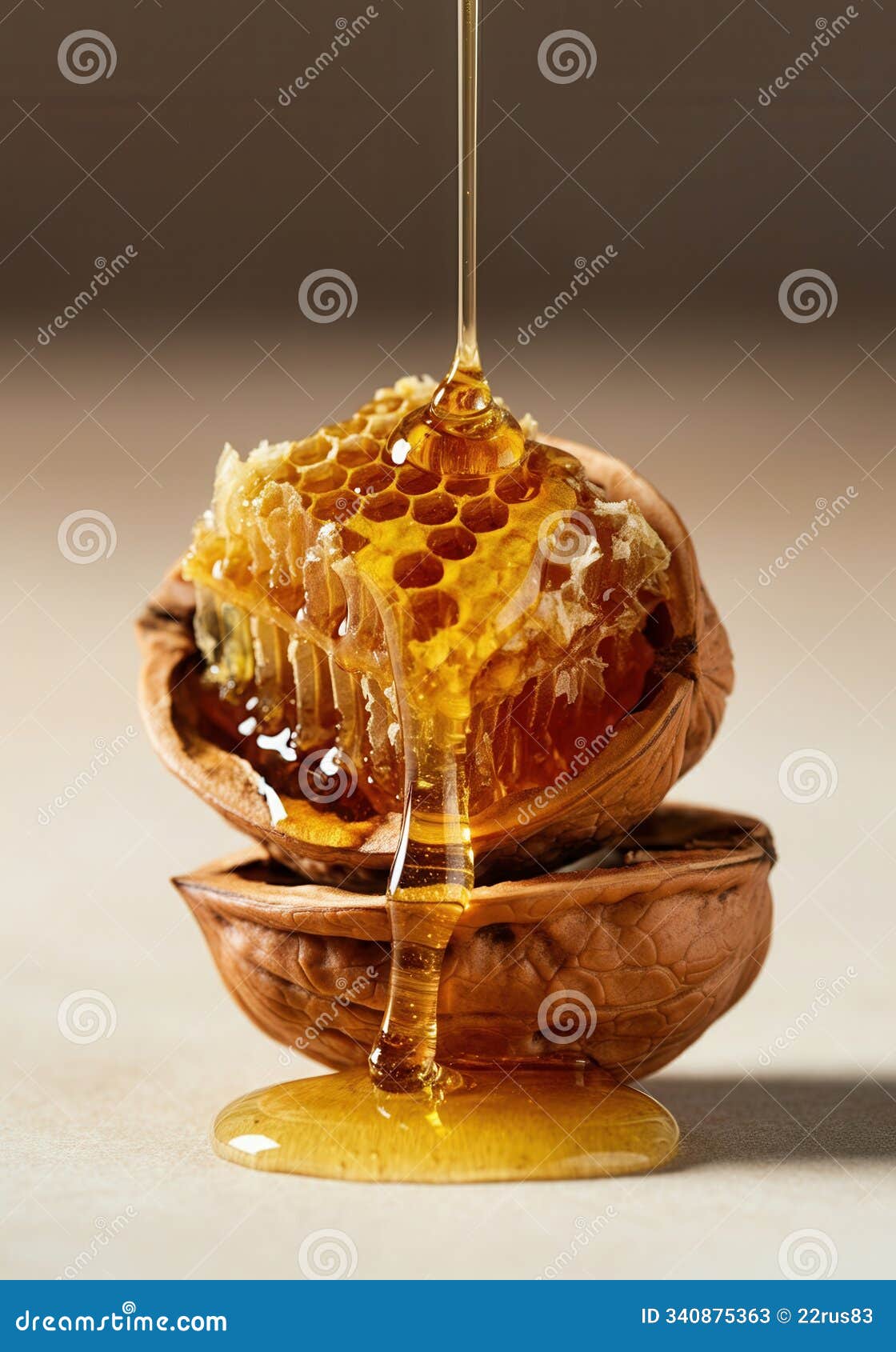 Honey Dripping from a Honeycomb into a Walnut Shell on a Smooth Surface ...