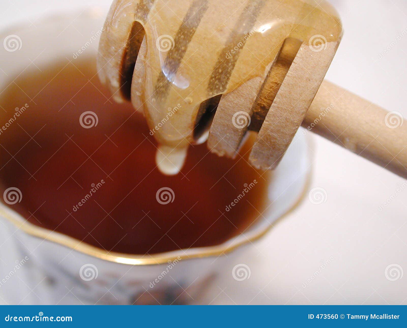 Honey dripping into tea stock photo. Image of health, close - 473560