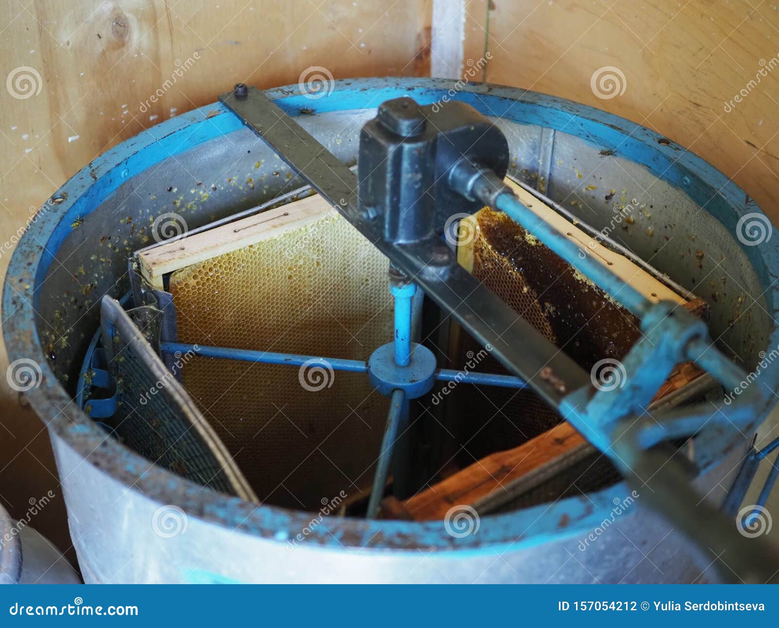 Honey Extractor with Honeycomb Wax with Honey Frame Stock Photo - Image ...
