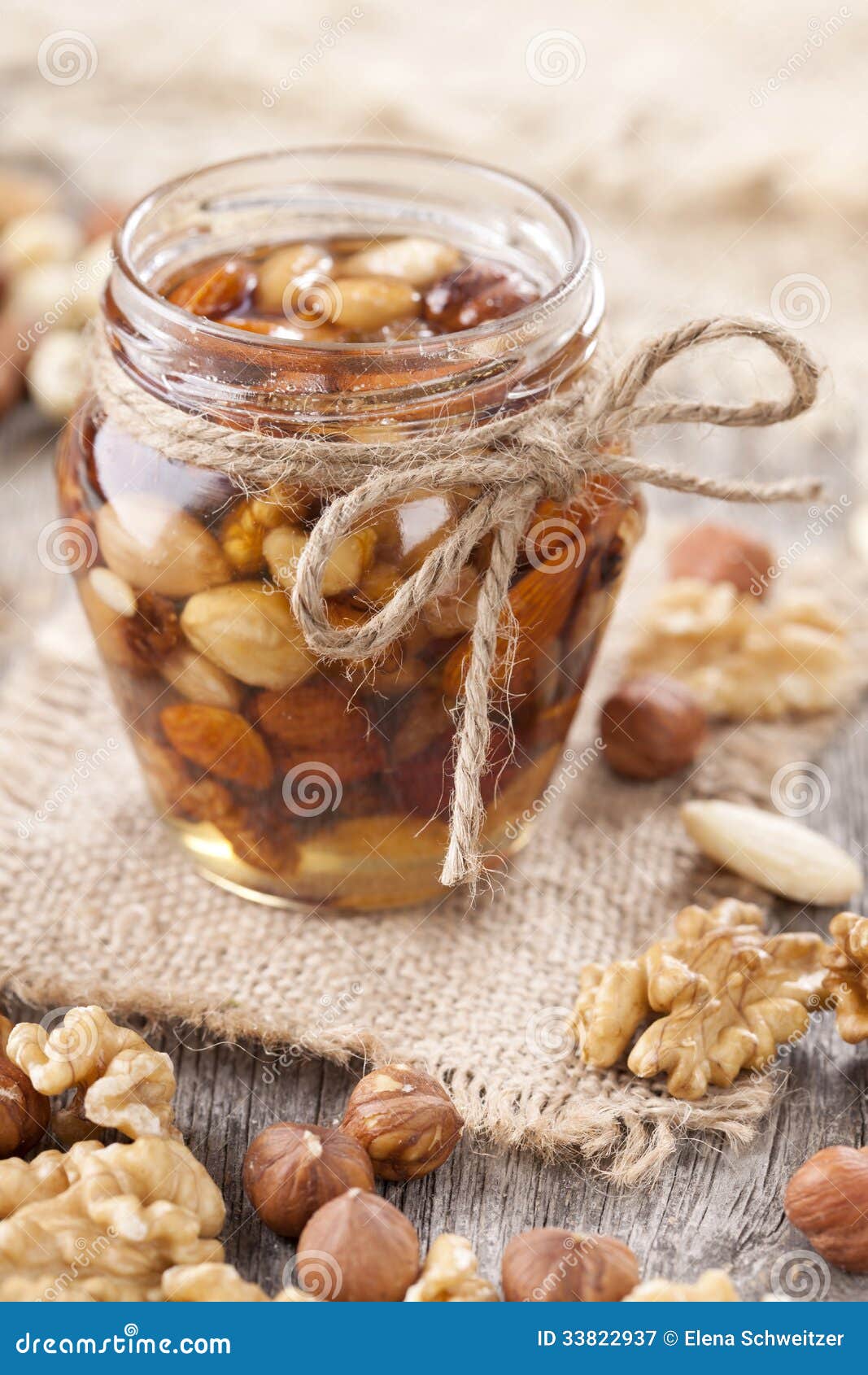 Honey and mixed nuts stock image. Image of pile, delicious - 33822937