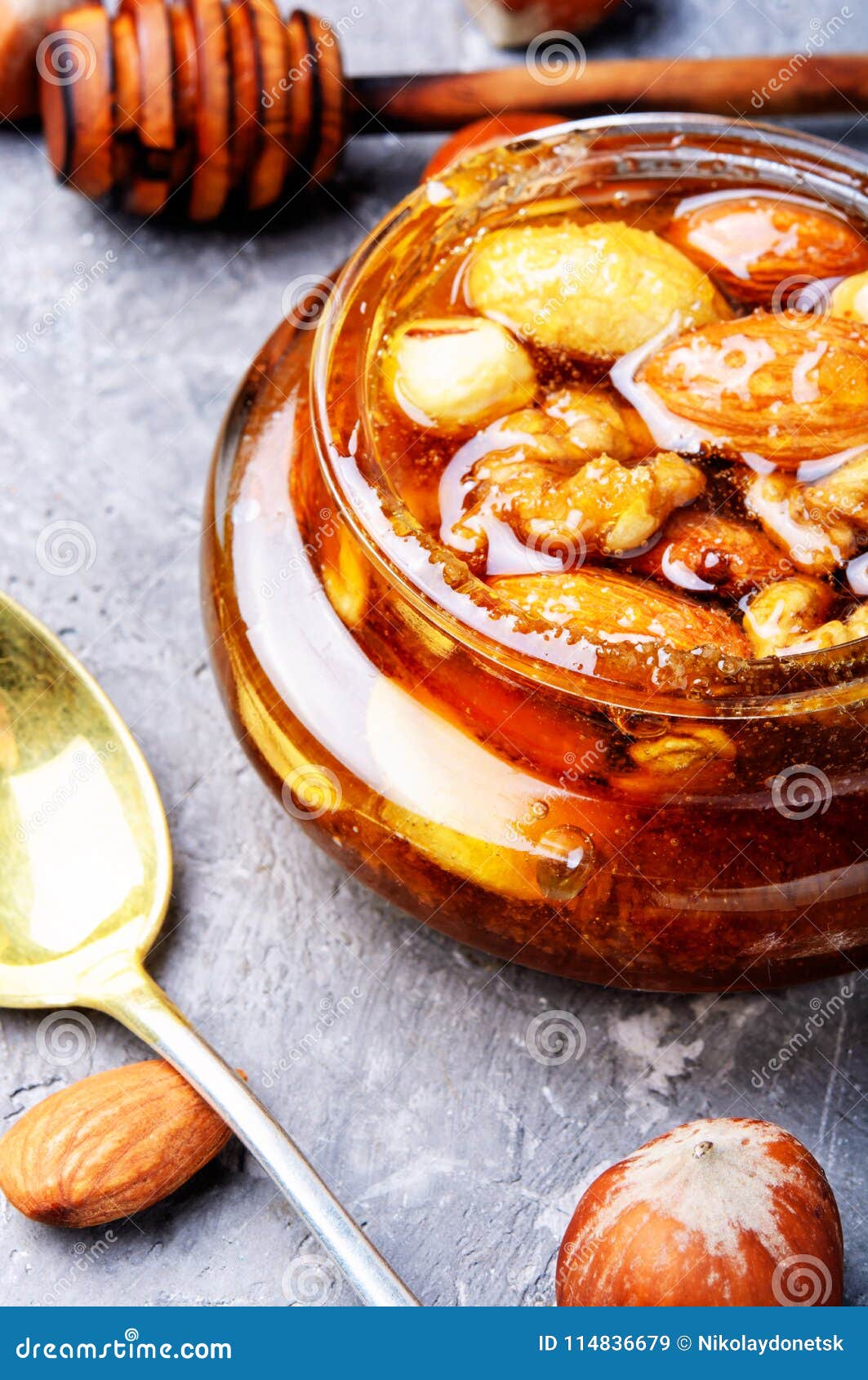 Honey with nuts stock image. Image of closeup, hazelnut - 114836679