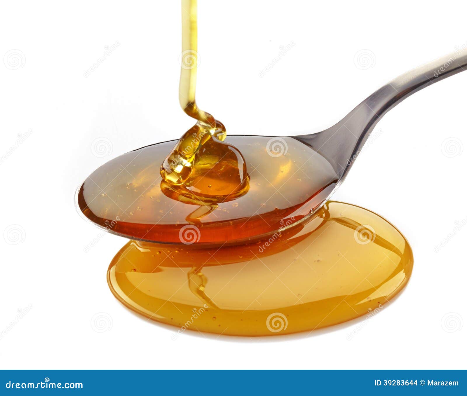 Honey pouring into spoon stock photo. Image of flowing - 39283644