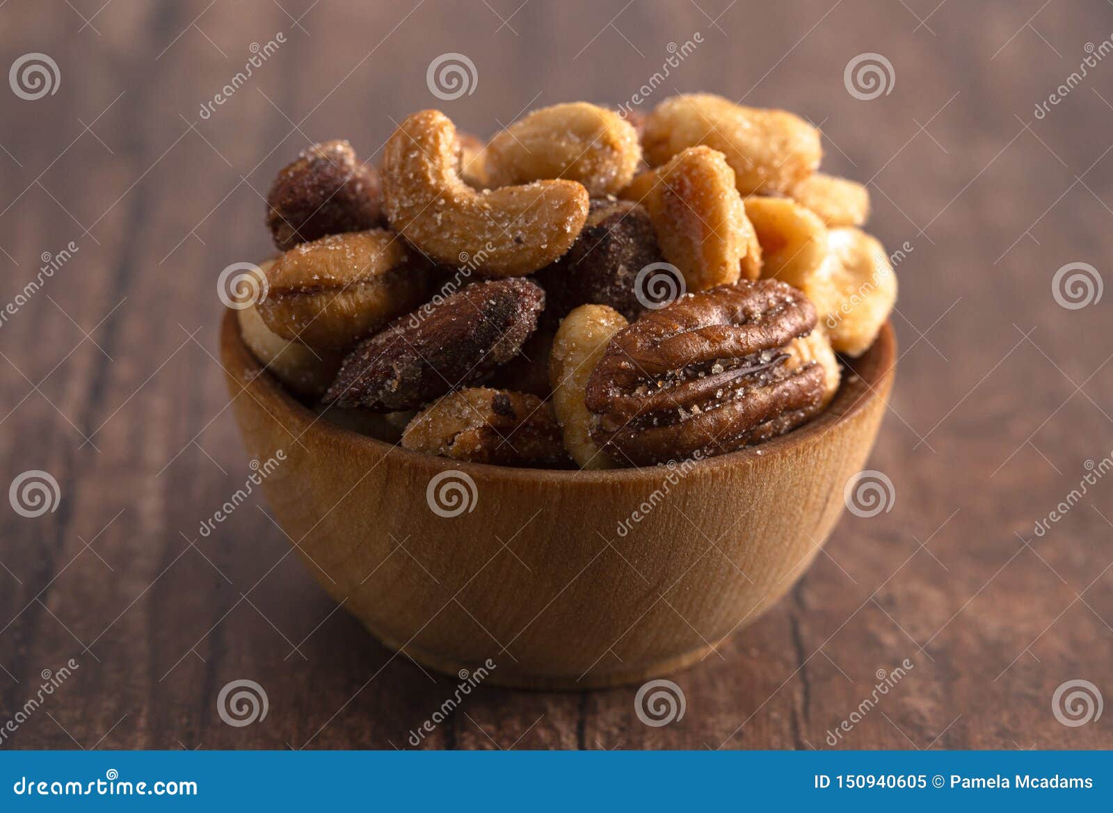 Honey Roasted Nuts on a Rustic Dark Wood Table Stock Image - Image of ...