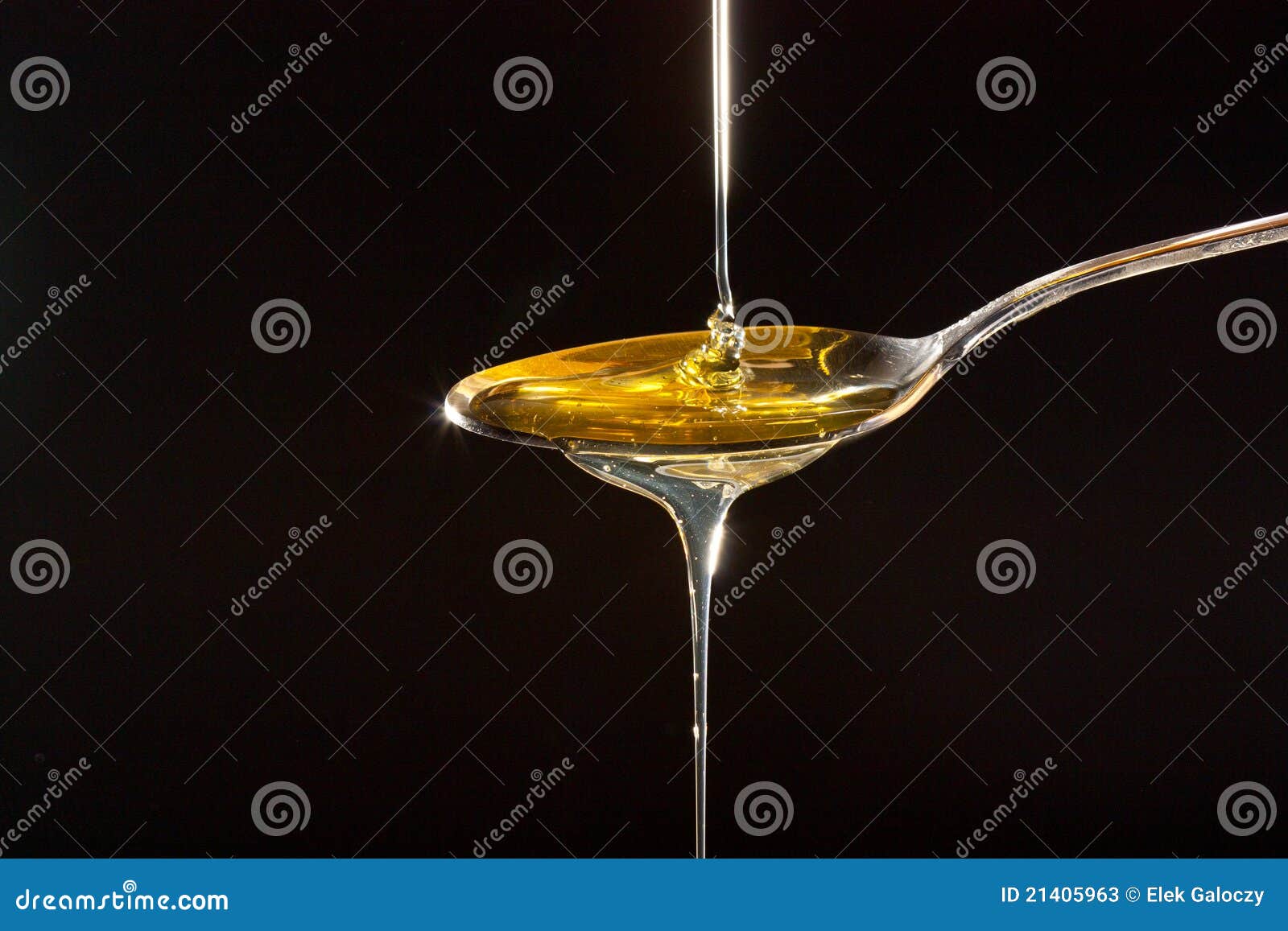 Honey in spoon stock image. Image of food, dense, flow - 21405963