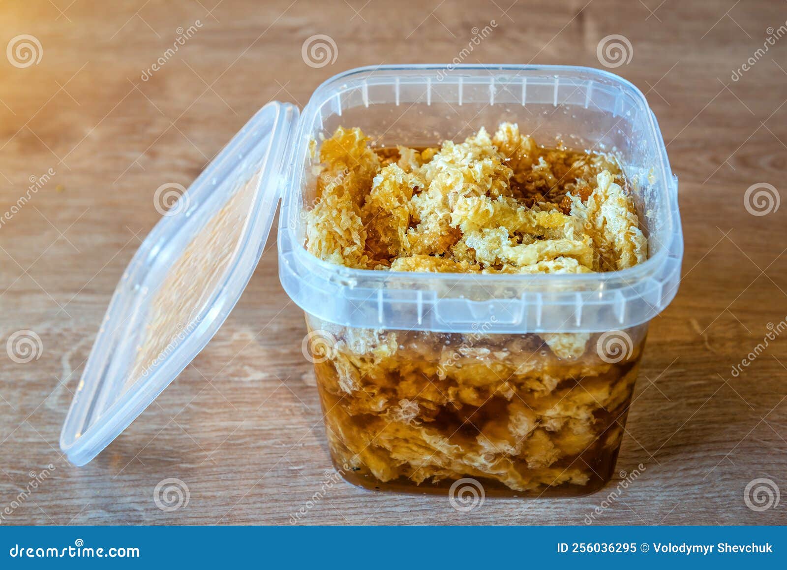 Honey with Wax Combs in a Plastic Bucket Stock Image - Image of golden ...