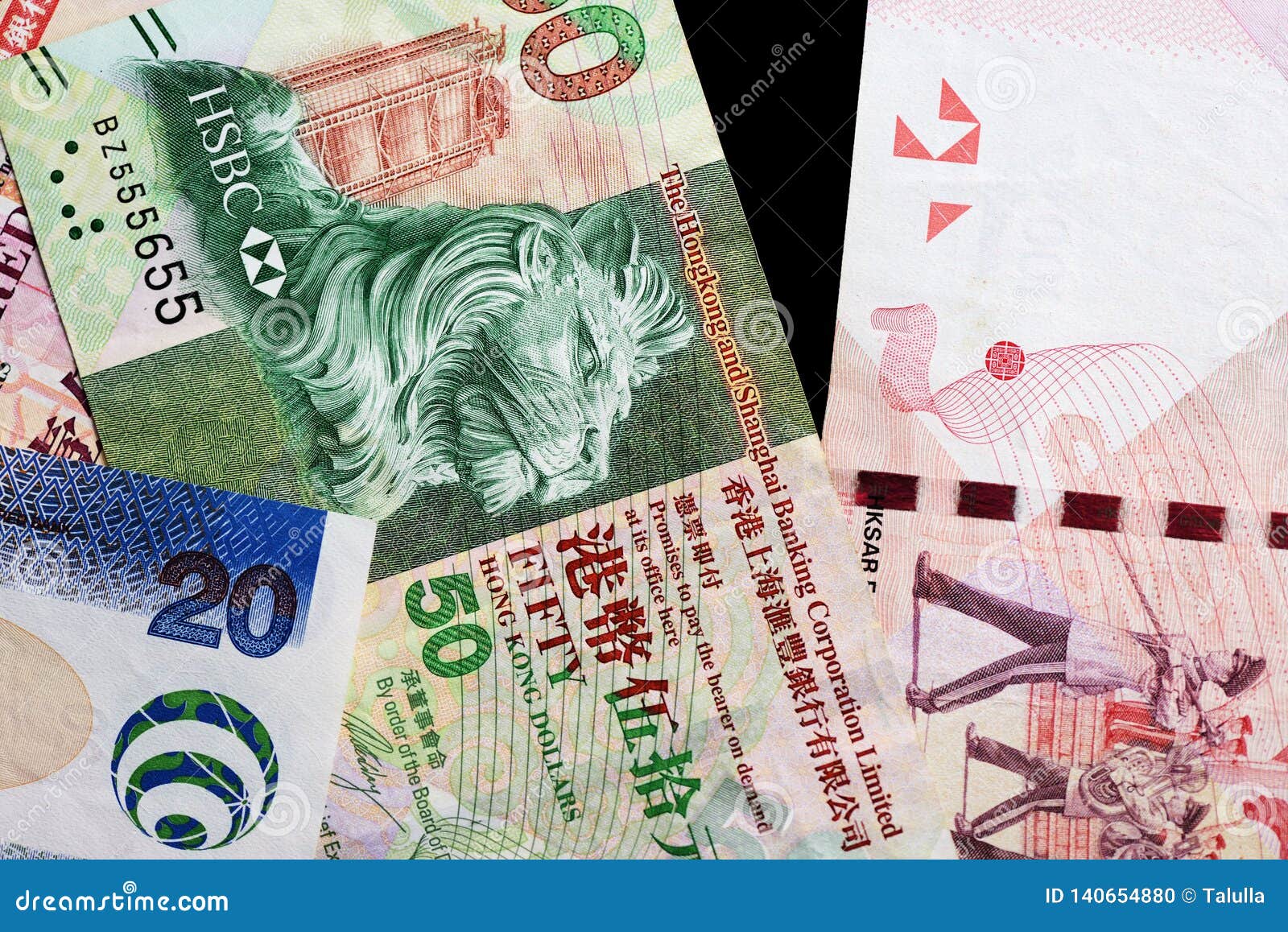 Hong Kong Dollars Bills on a Dark Background Stock Photo - Image of ...