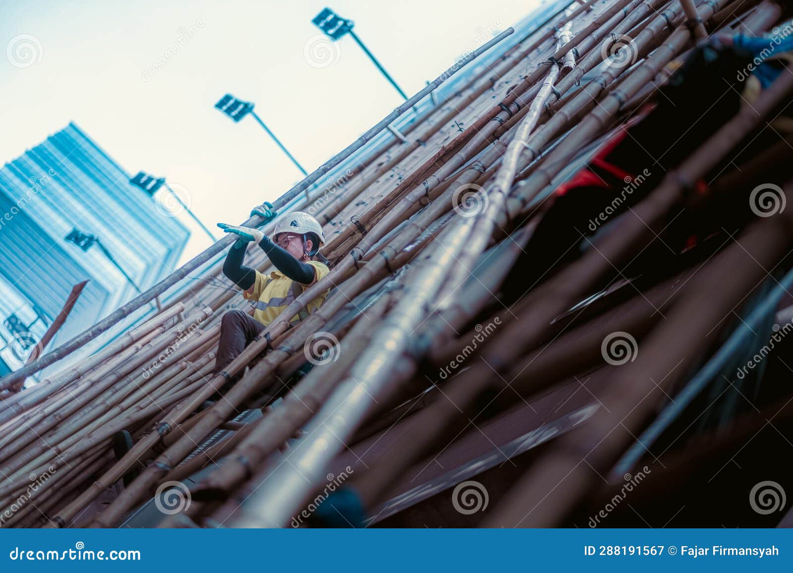 Two Worker Man Climbing High Concrete Pile For Welding Steel House ...
