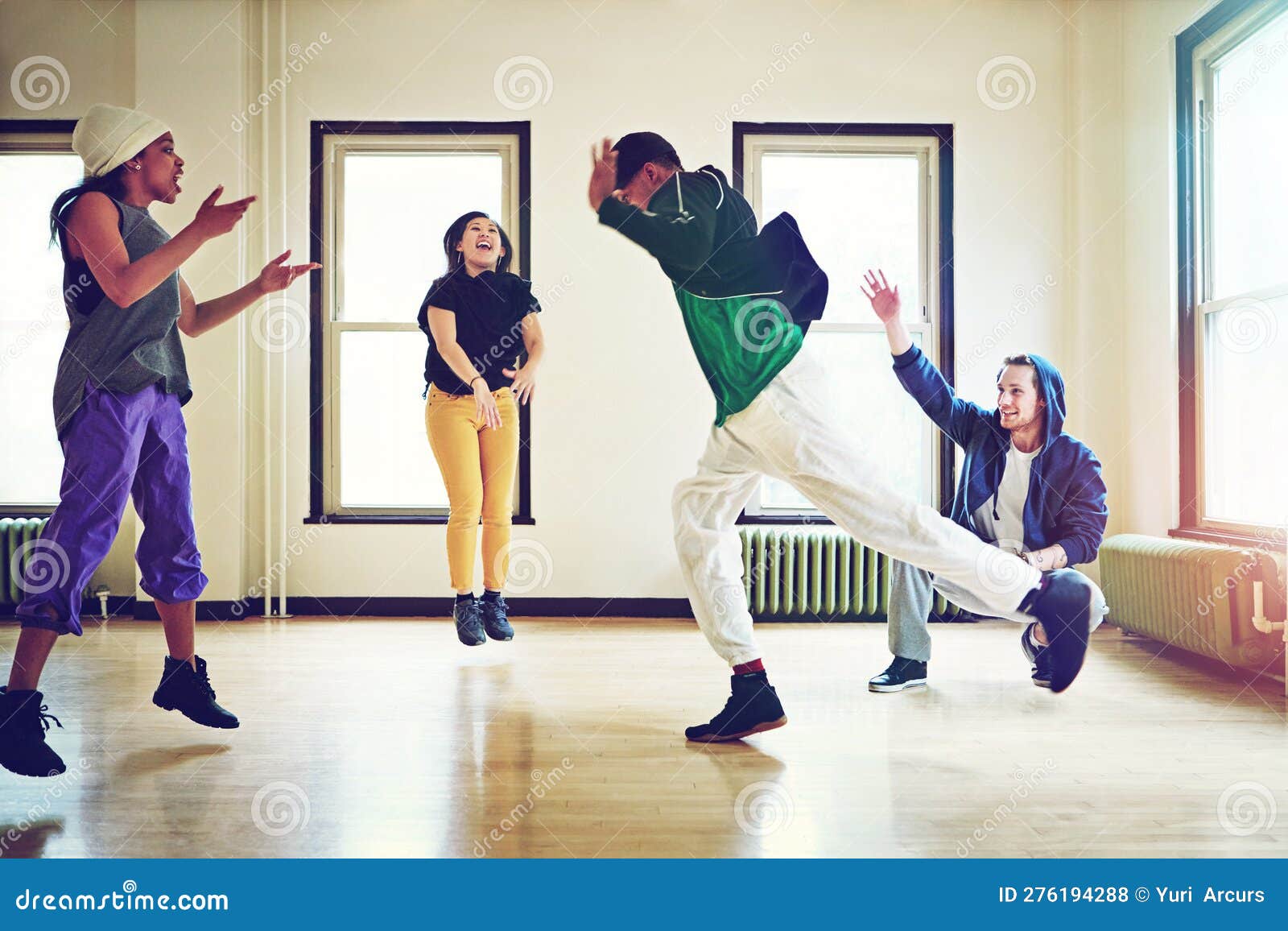 Honoring Their Love of Dance. a Group of Young Friends Dancing Together ...