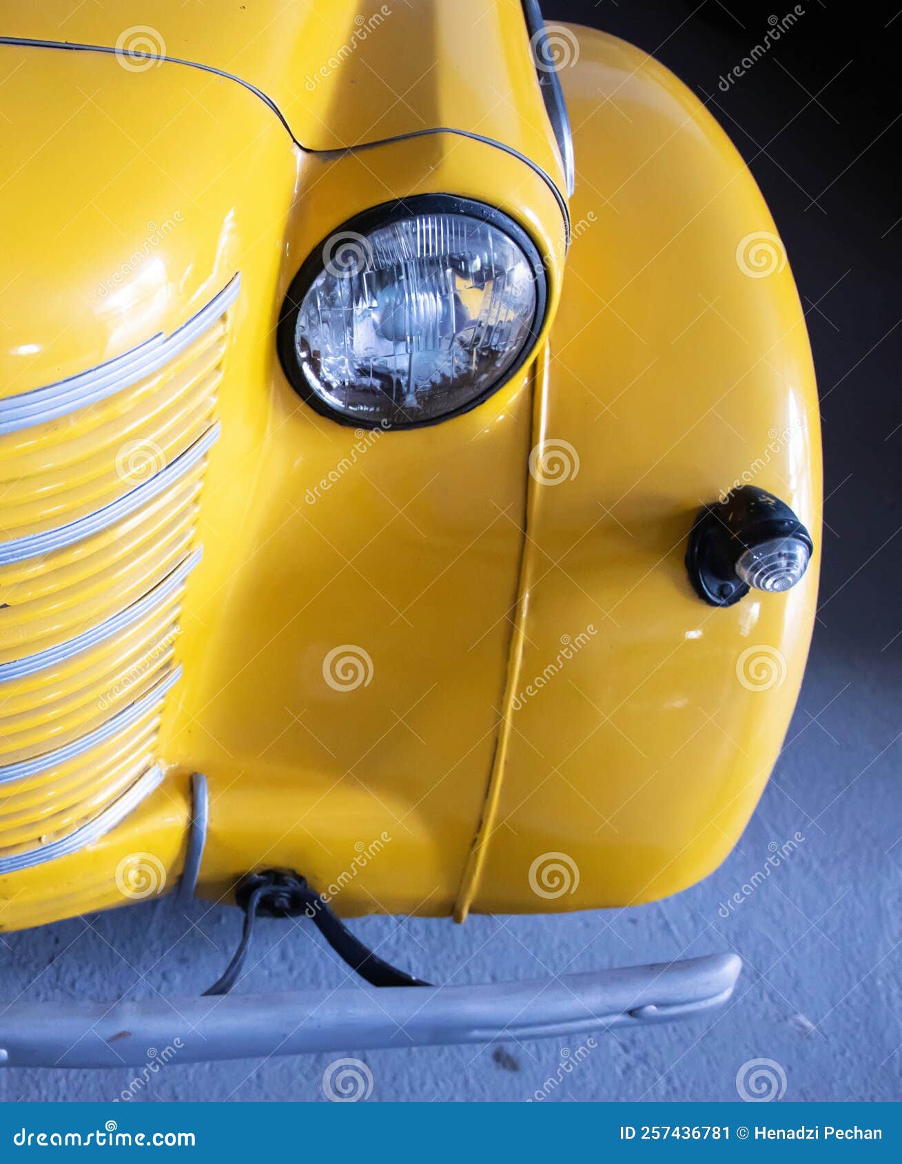Hood and Fender with Headlight of a Yellow Retro Car, Close-up ... Hood and Fender with Headlight of a Yellow Retro Car, Close-up ...