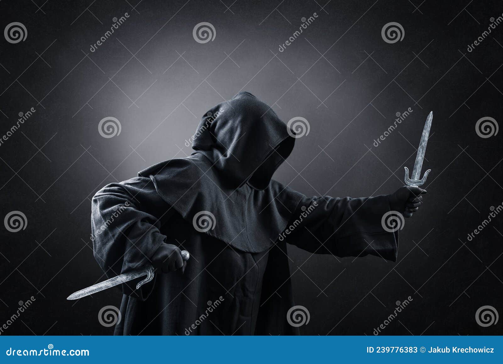 Hooded Assassin with Two Daggers in the Dark Stock Image - Image of ...