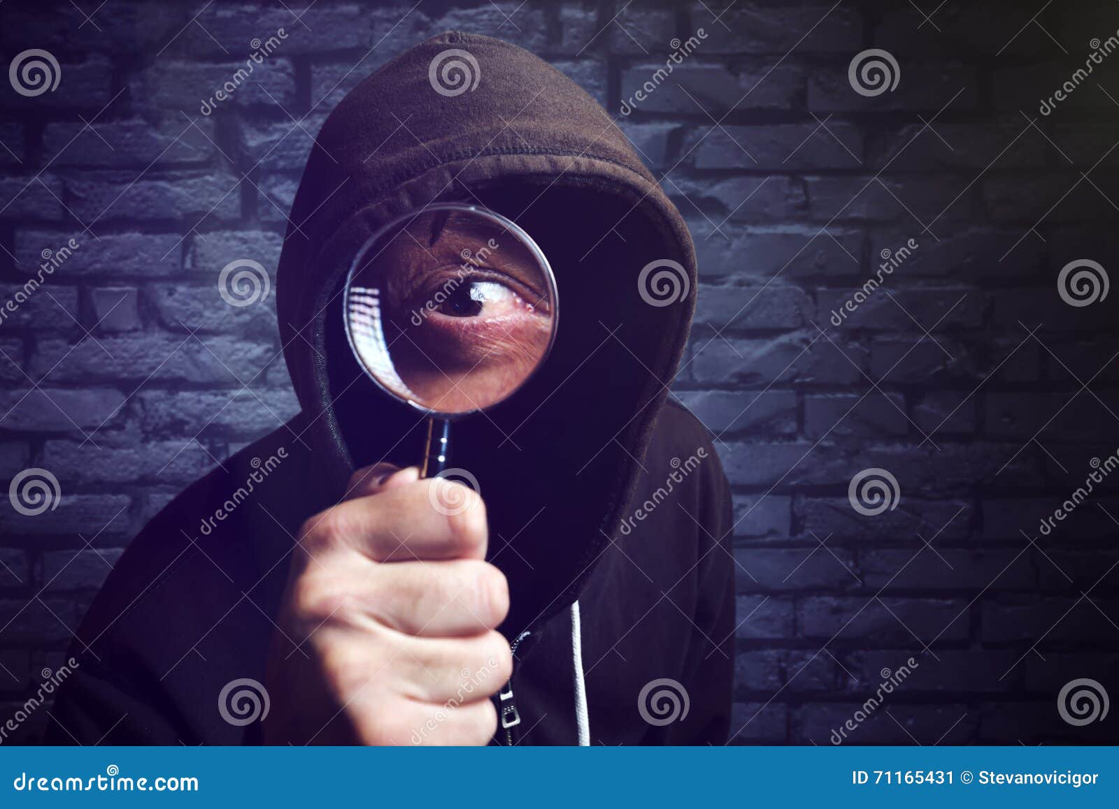Hooded Computer Hacker with Magnifying Glass Stock Image - Image of ...