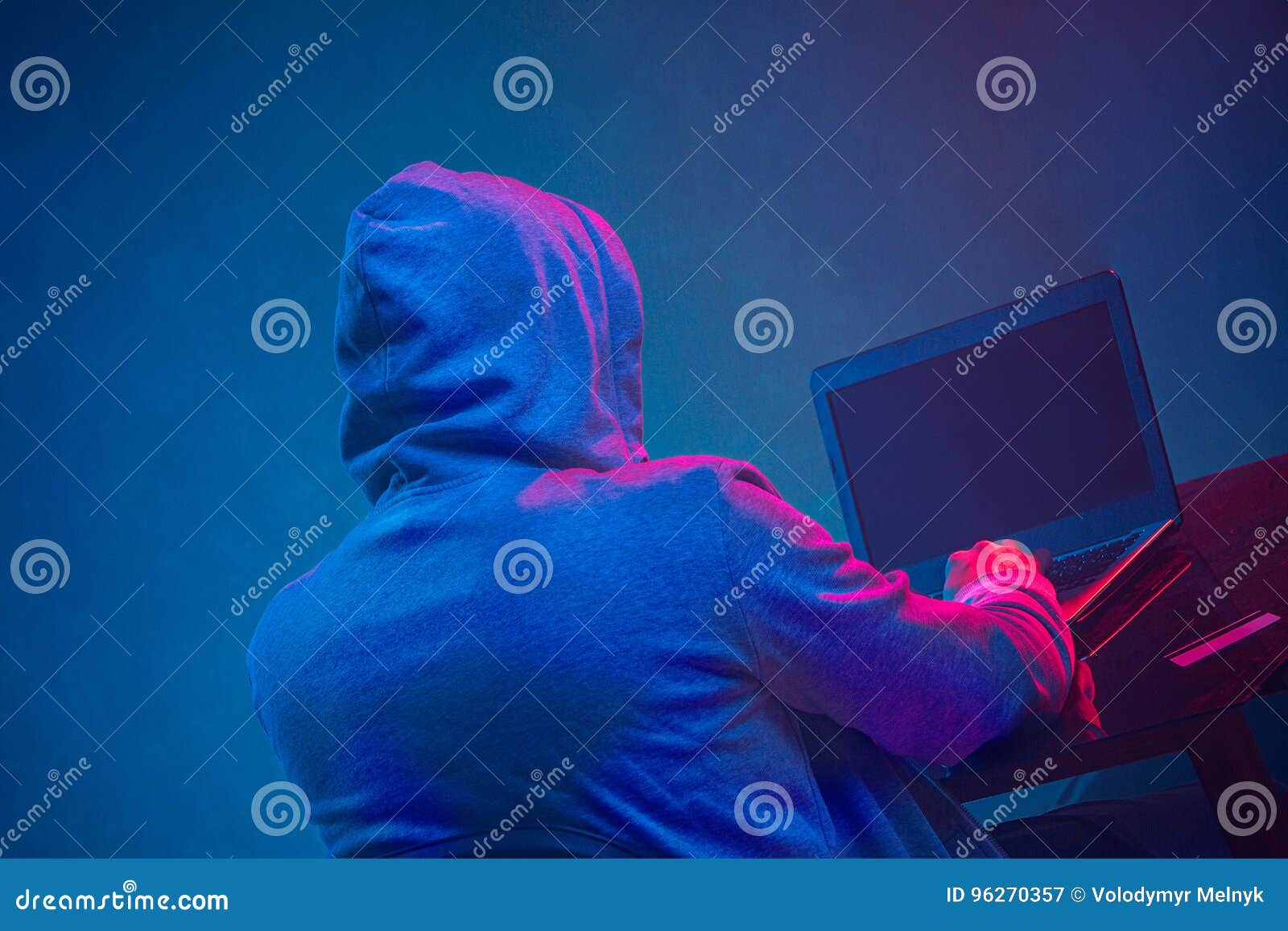 Hooded Computer Hacker Stealing Information with Laptop Stock Image ...