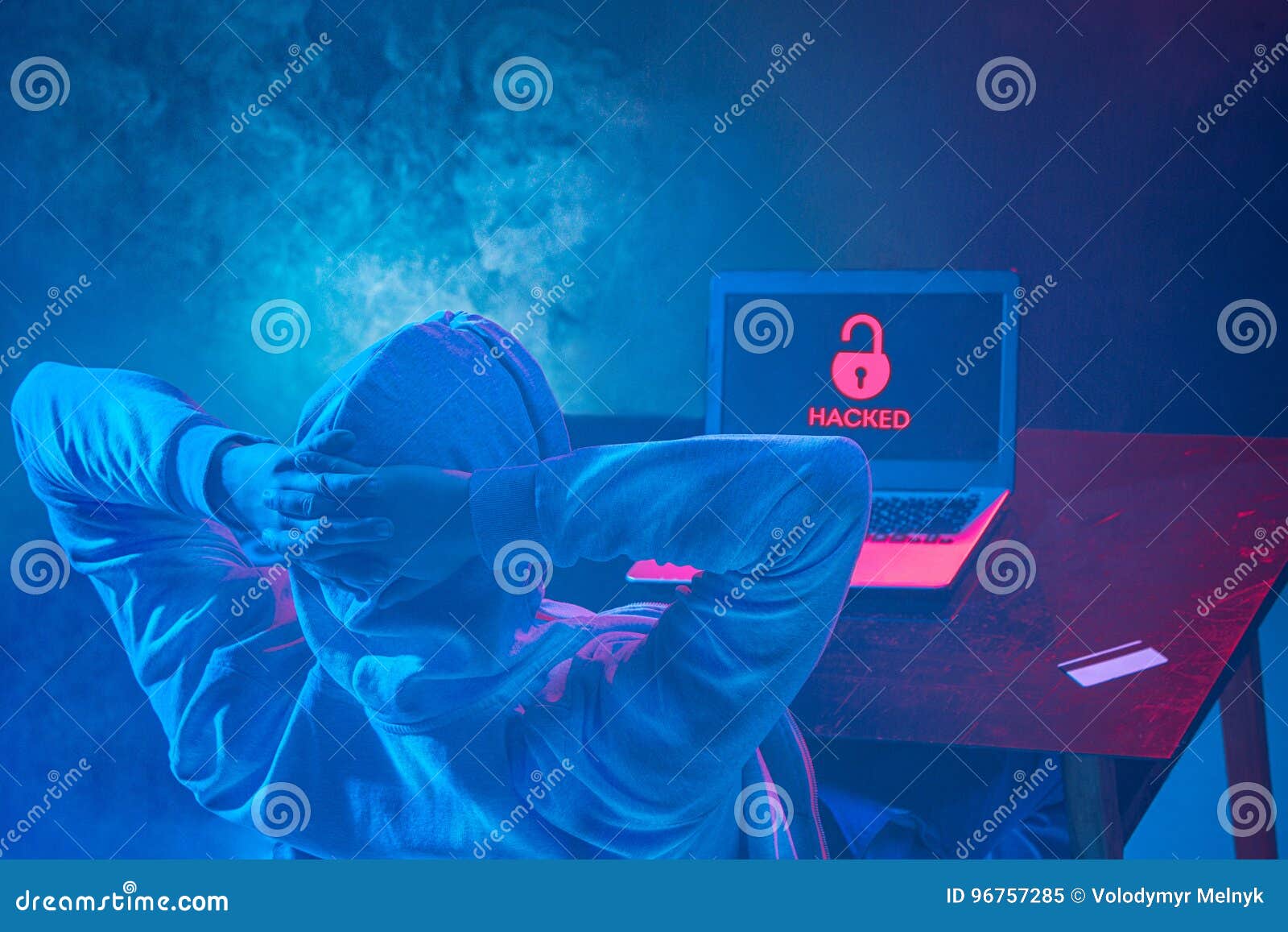 Hooded Computer Hacker Stealing Information with Laptop Stock Image ...