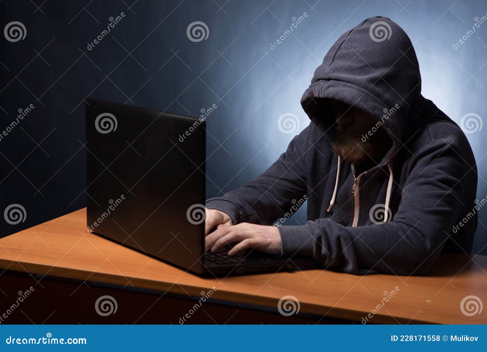 Hooded Computer Hacker Stealing Information with Laptop Stock Photo ...