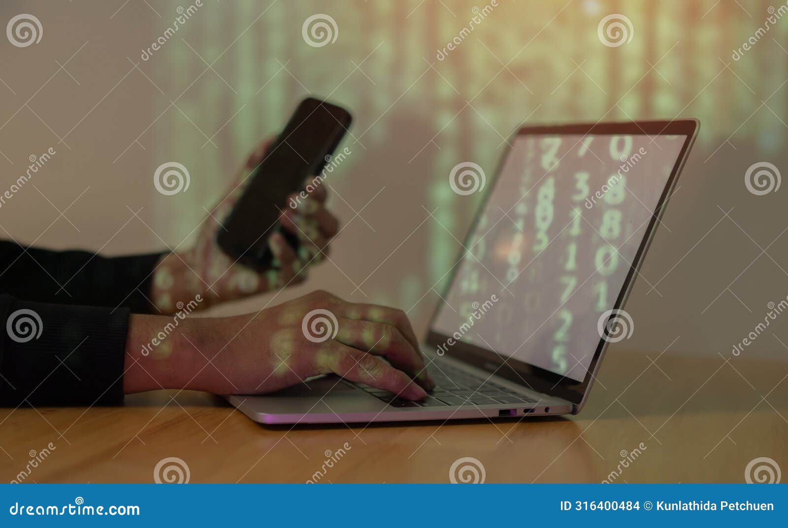 Hooded Computer Hacker Use Phone and Stealing Information with Laptop ...