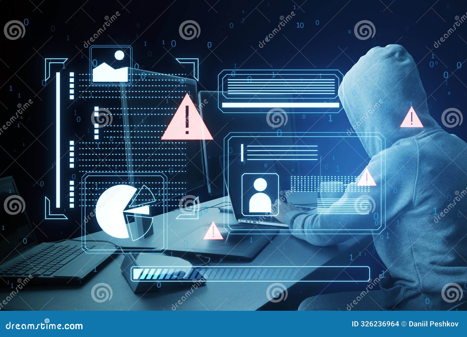 A Hooded Figure Using a Laptop with Cyber Security Graphics Overlay ...