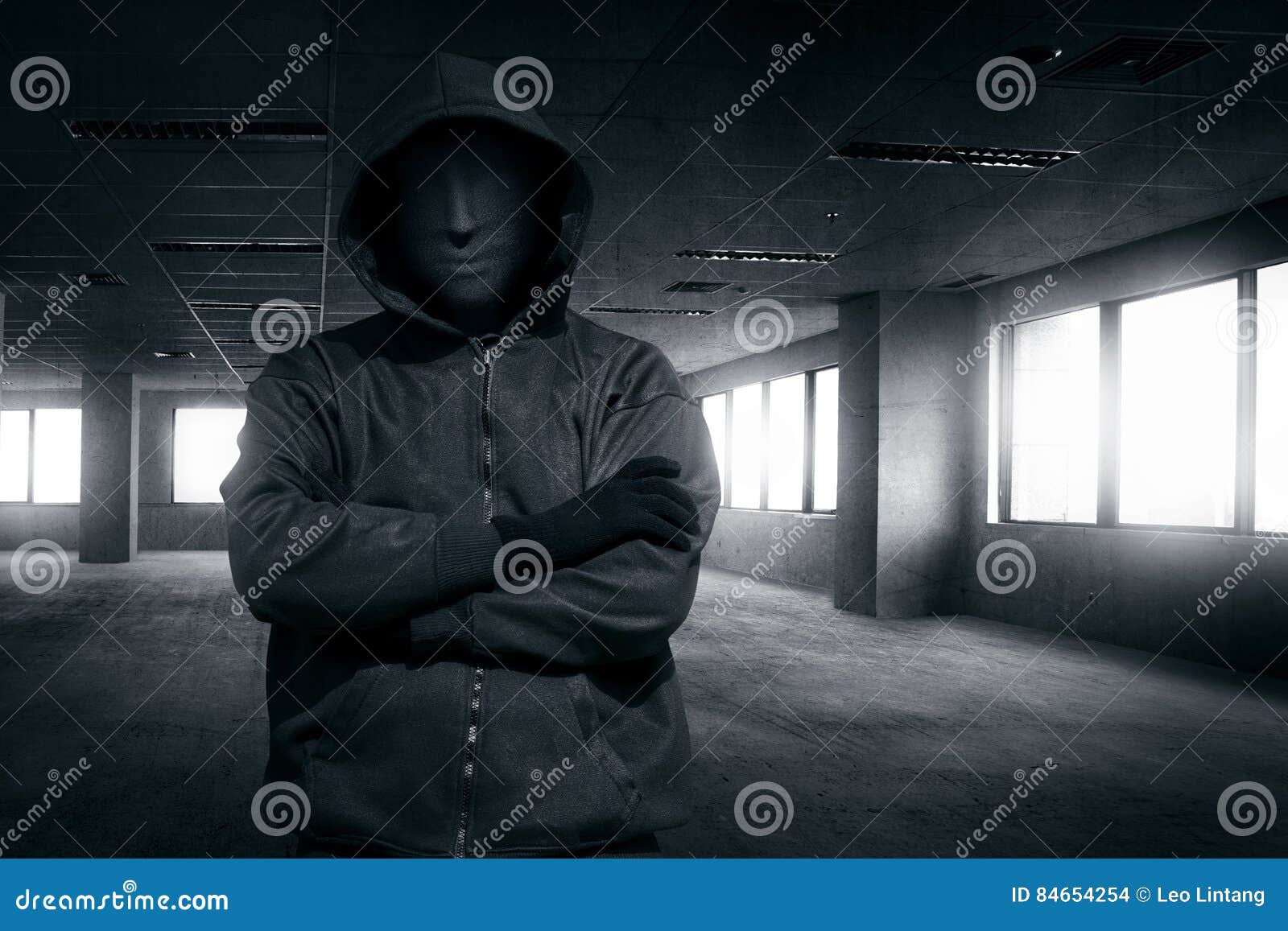 Hooded Man with Mask Standing Alone Stock Photo - Image of covered ...