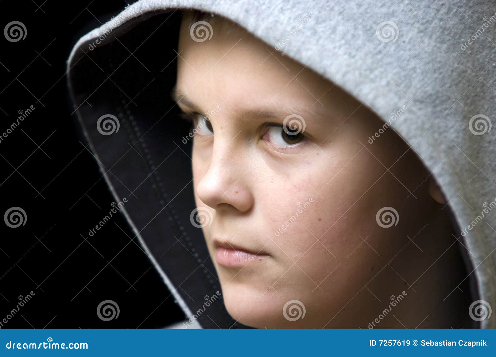 Hooded teenage boy stock image. Image of gazing, brown - 7257619