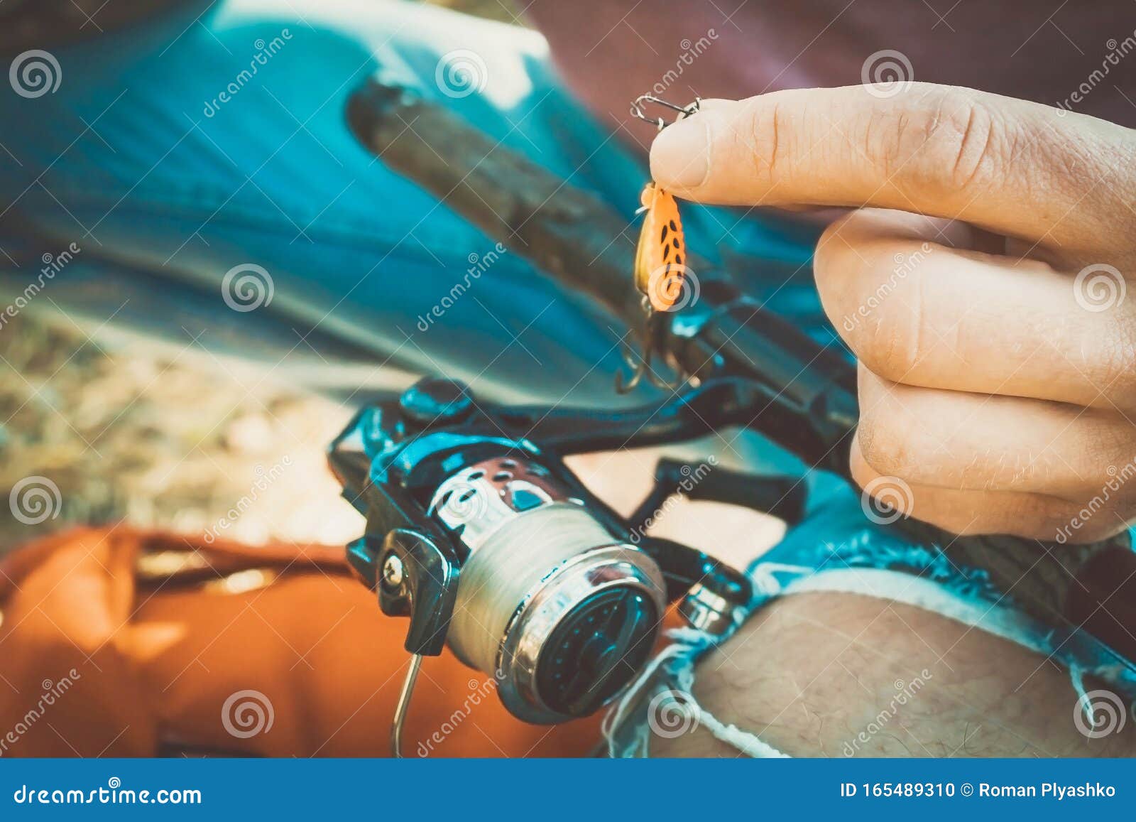 Hook in the Hands of a Fisherman Stock Photo - Image of line, catch ...