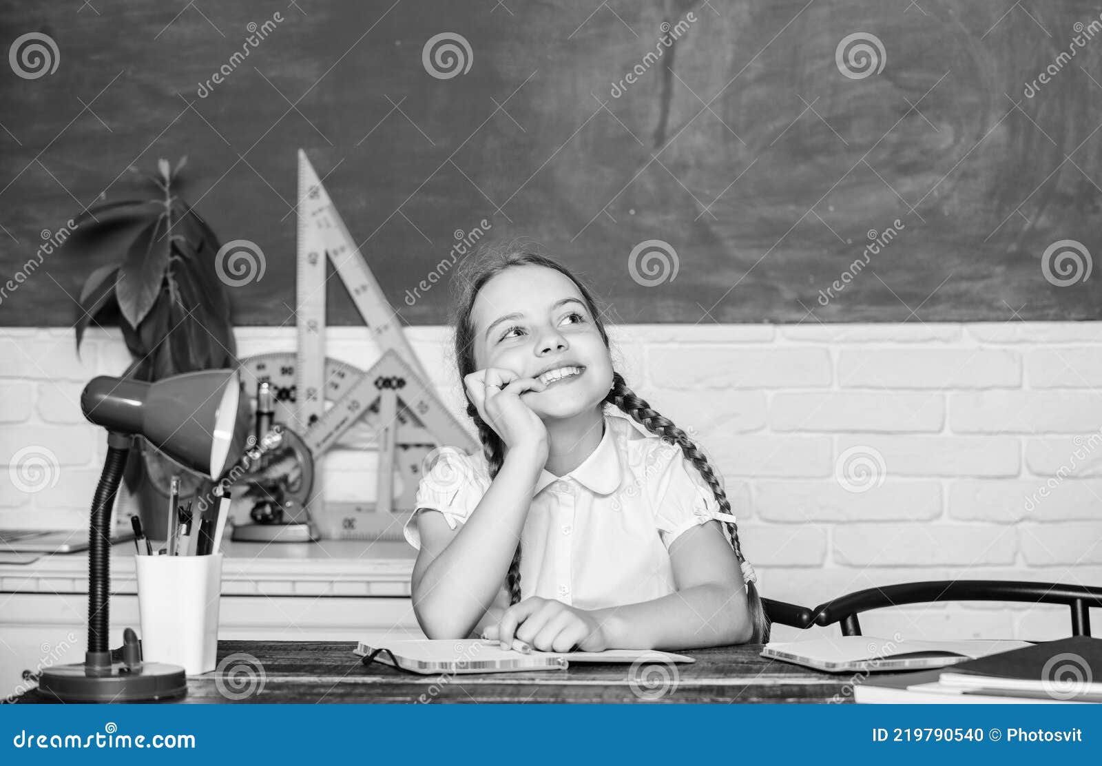 Hooked On Learning. Girl Cute Child Sit School Classroom Chalkboard ...
